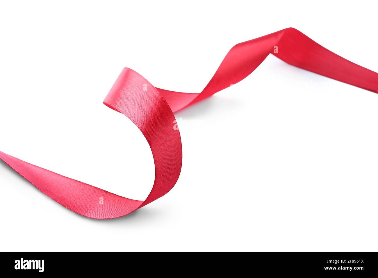Red ribbon on white background Stock Photo - Alamy