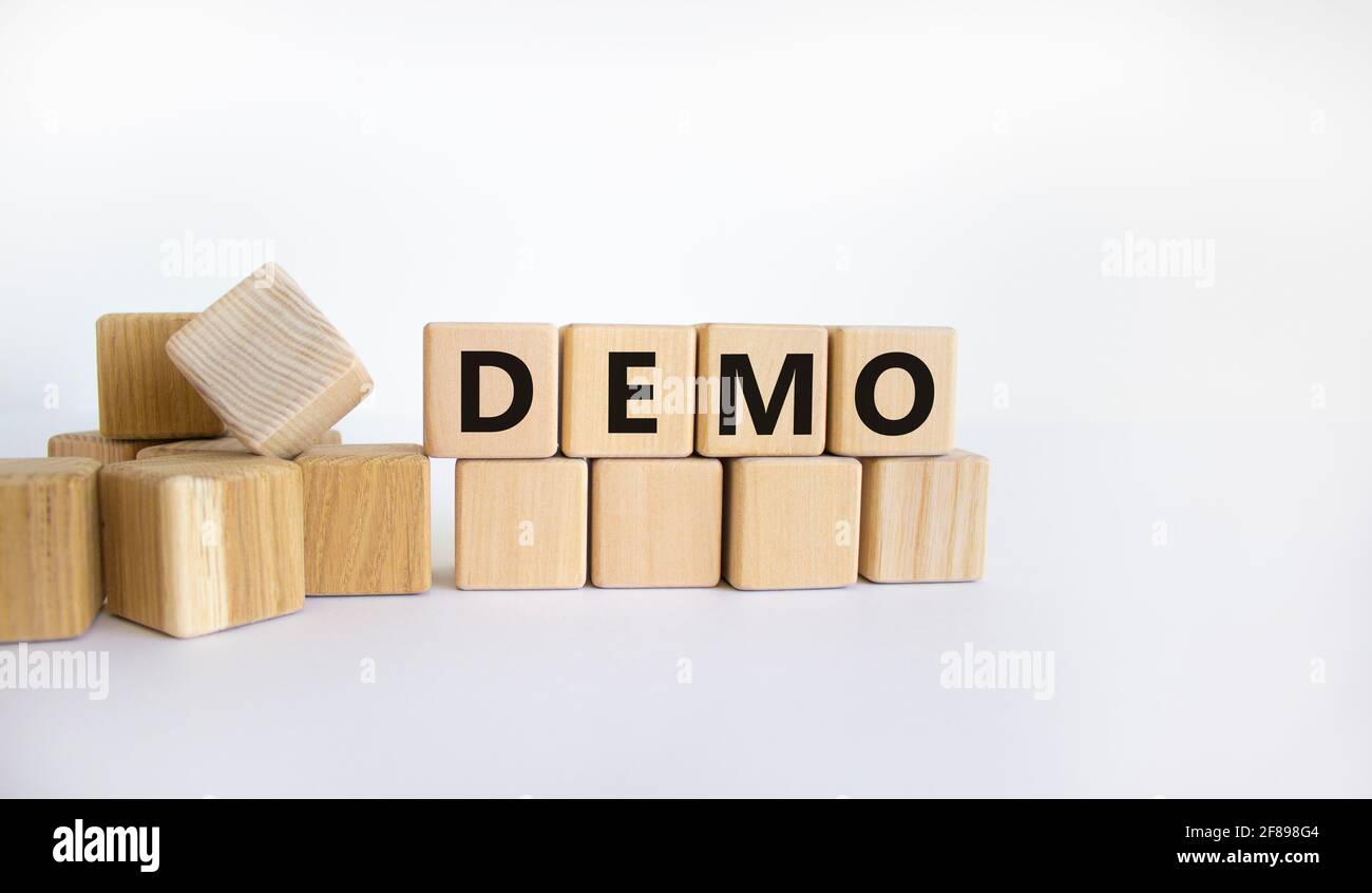 Demo symbol. Concept word 'demo' on wooden cubes on a beautiful white ...