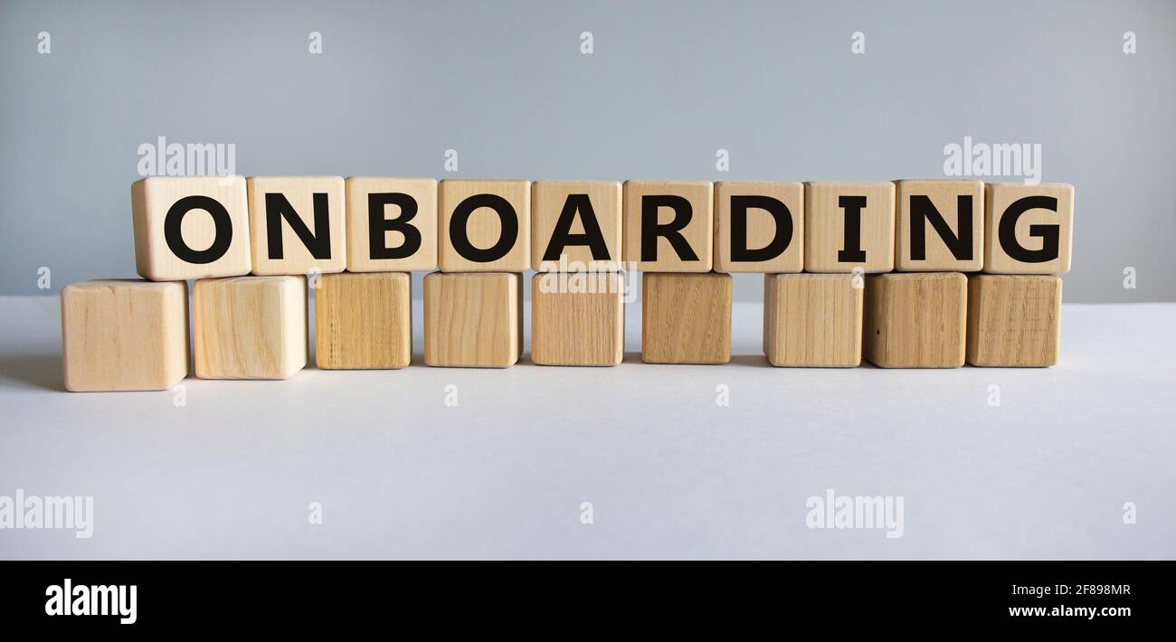 Onboarding symbol. The word 'Onboarding' on wooden cubes. Business and ...