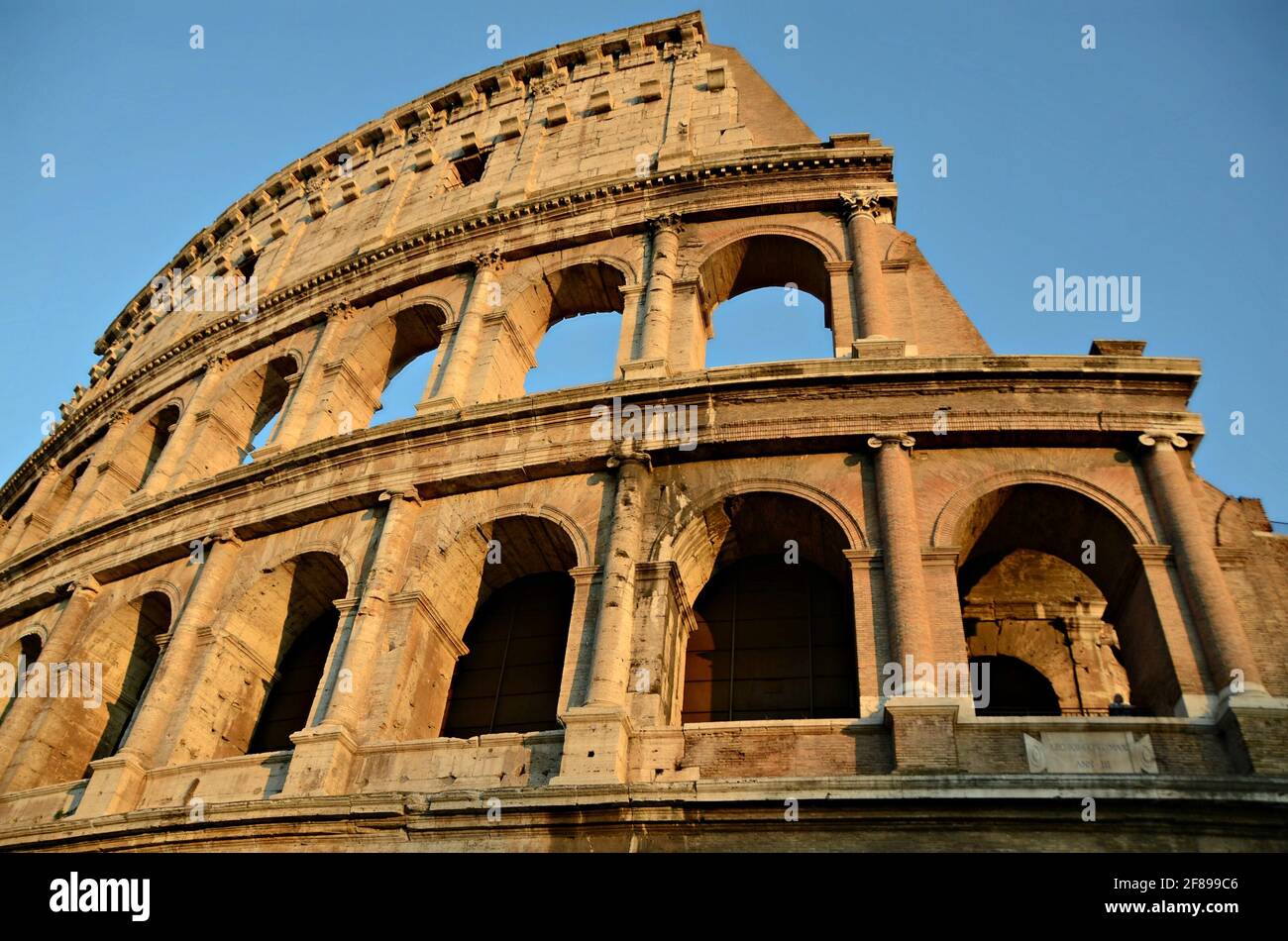 Scenic facade view of the ancient Colosseum Amphitheater in Rome, Italy ...