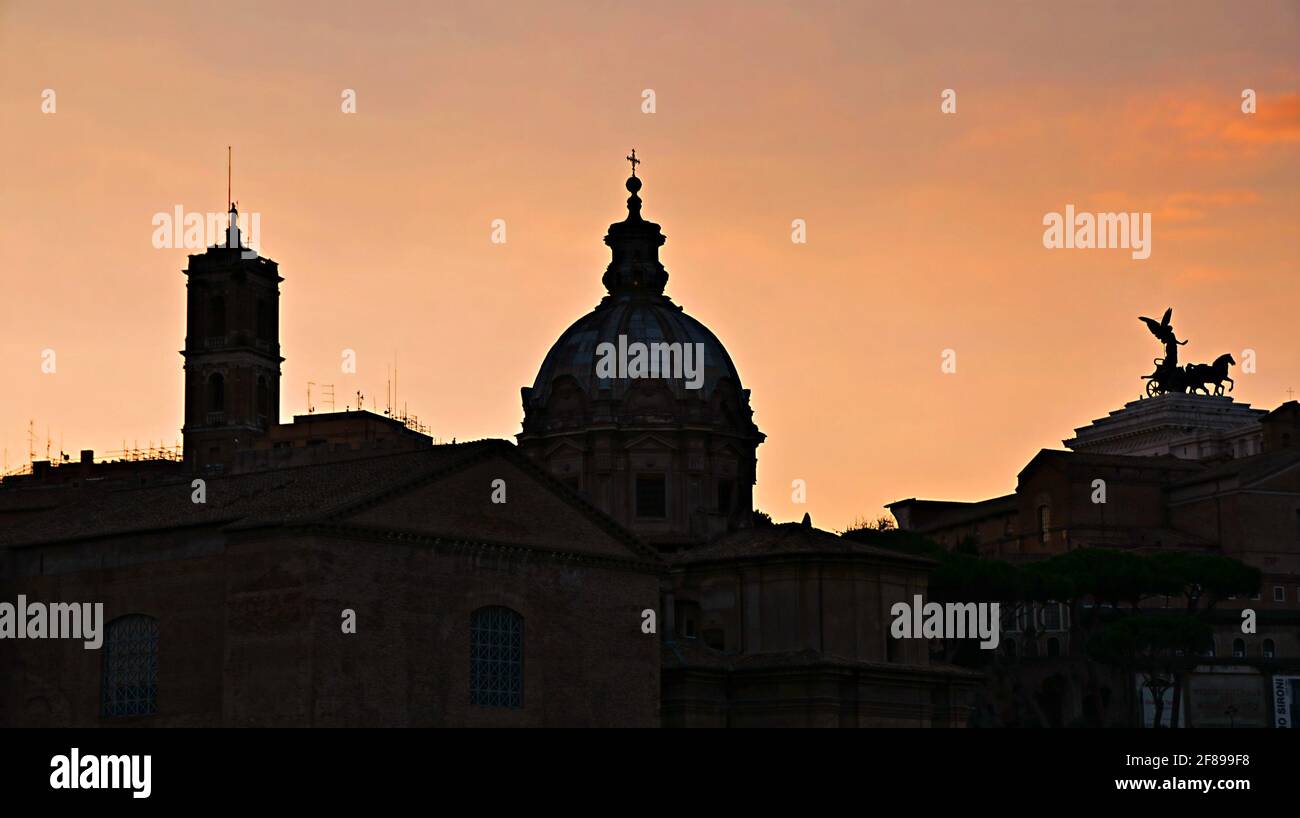 Sunset over ancient Roman historic monuments in Rome, Italy Stock Photo ...