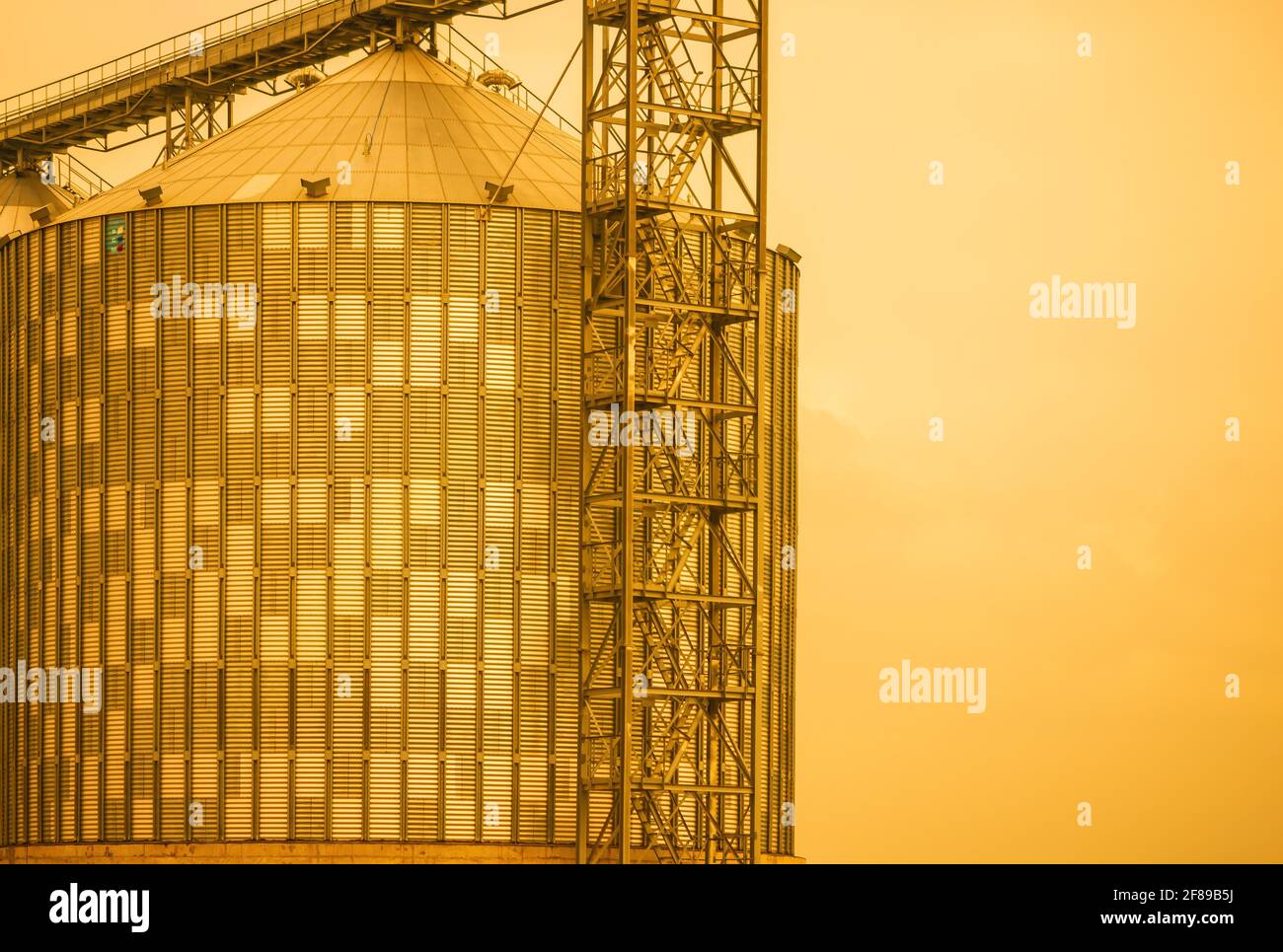 Grain elevator. Metal grain elevator in agricultural zone. Agriculture ...