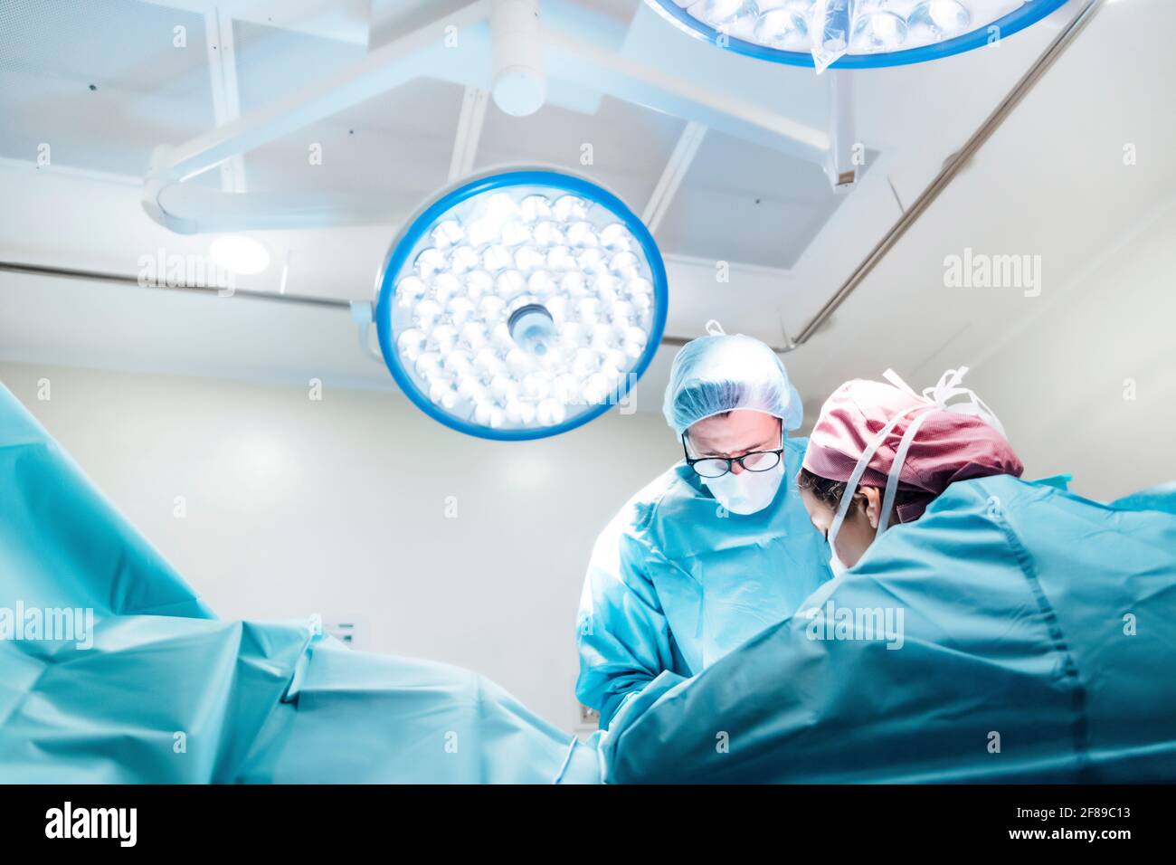 Professional medical team performing surgery at the hospital Stock ...