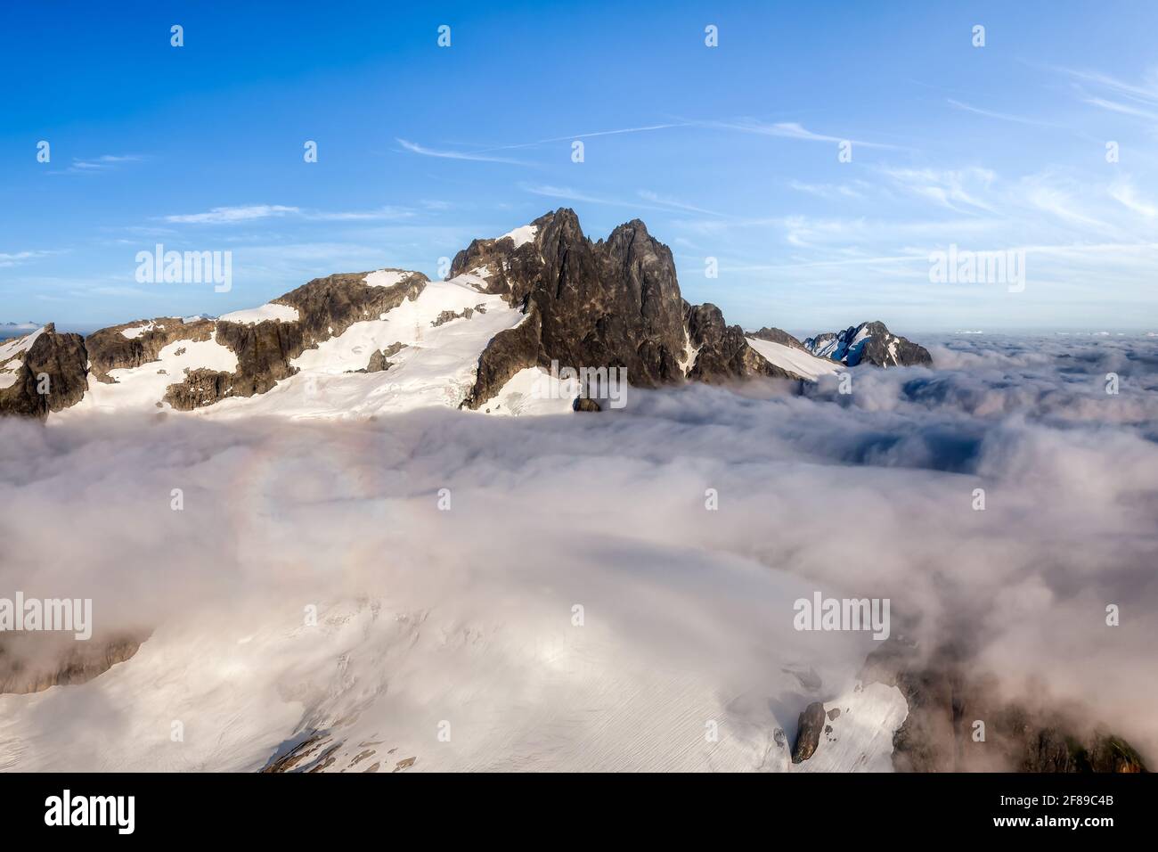 Aerial View from Airplane of Tantalus Range covered in clouds Stock ...
