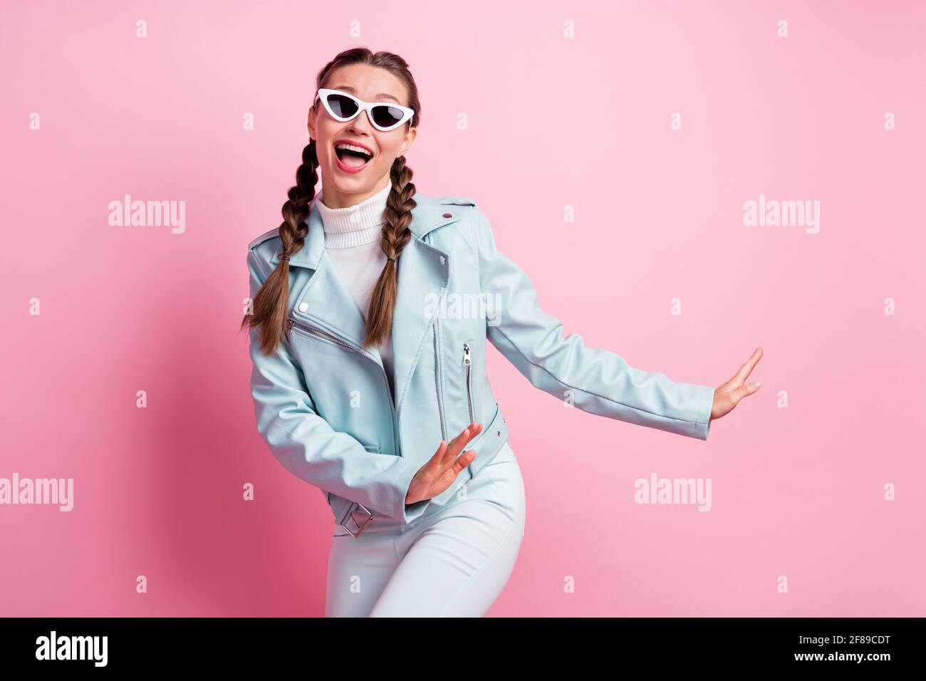 Photo of young cheerful girl happy positive smile have fun enjoy music ...