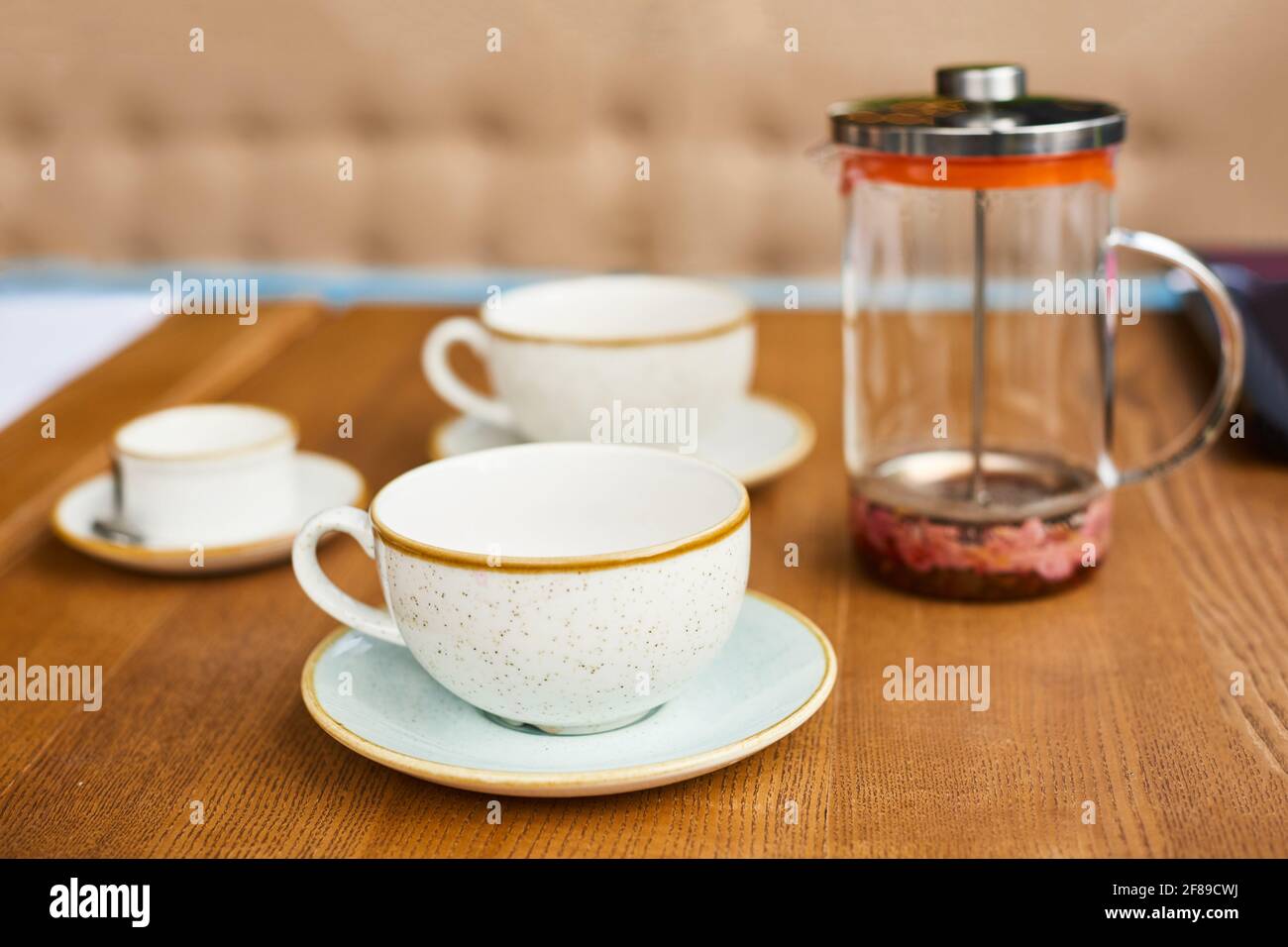 Finished teapot and cups hi-res stock photography and images - Alamy