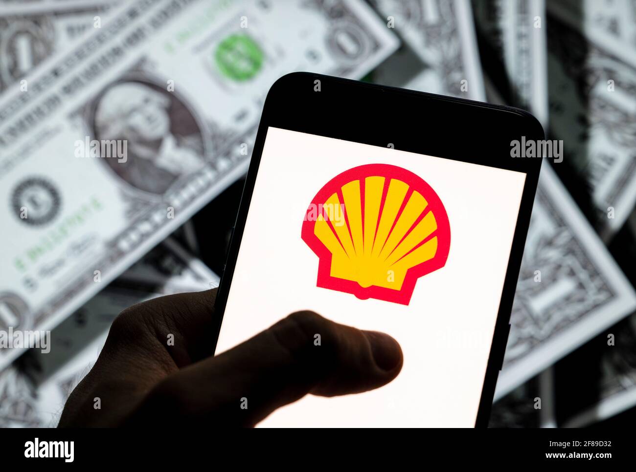 In this photo illustration, the global group of energy and ...