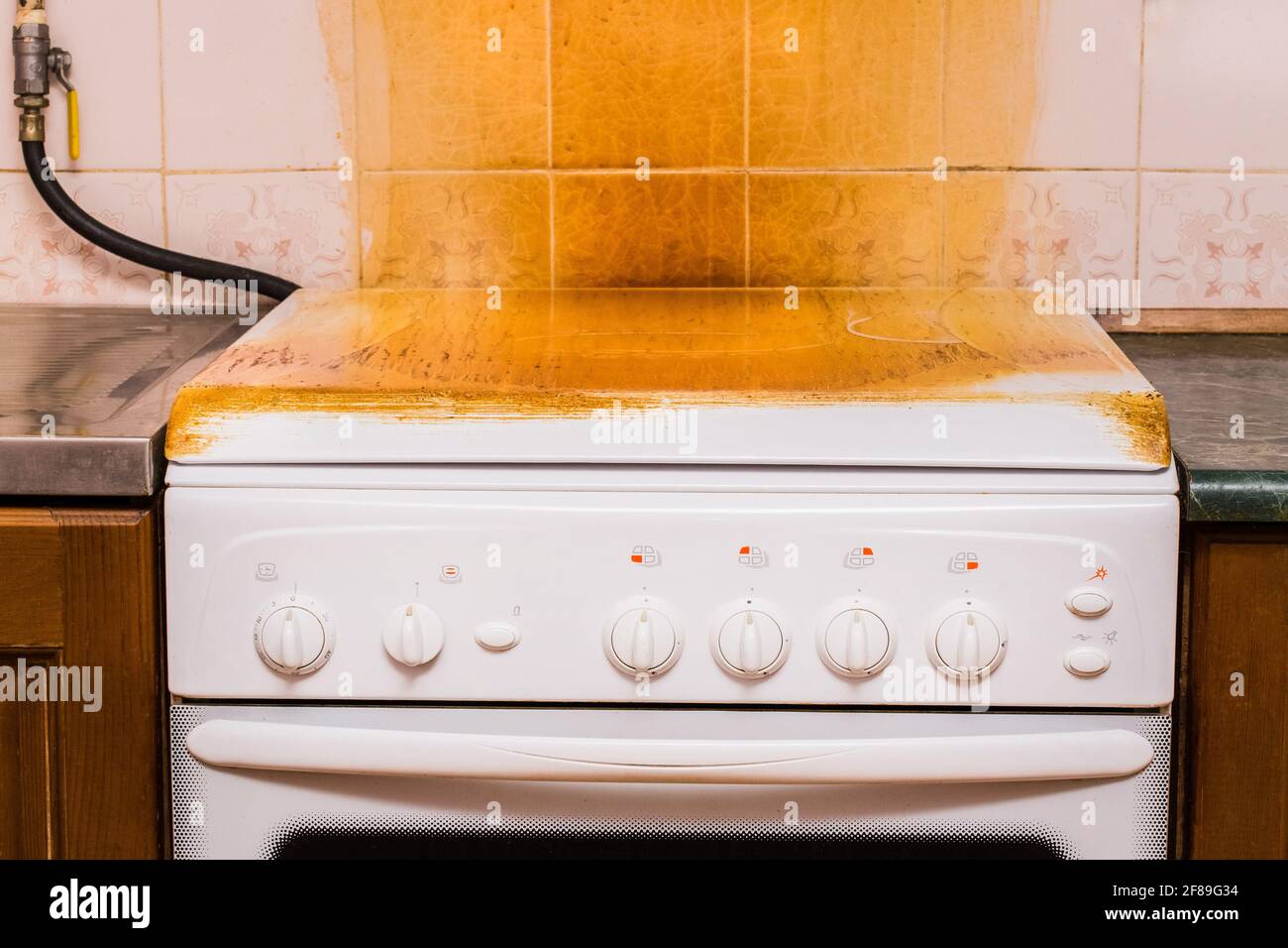 Dirty sticky coating on a gas stove. Home cleaning in the kitchen Stock ...