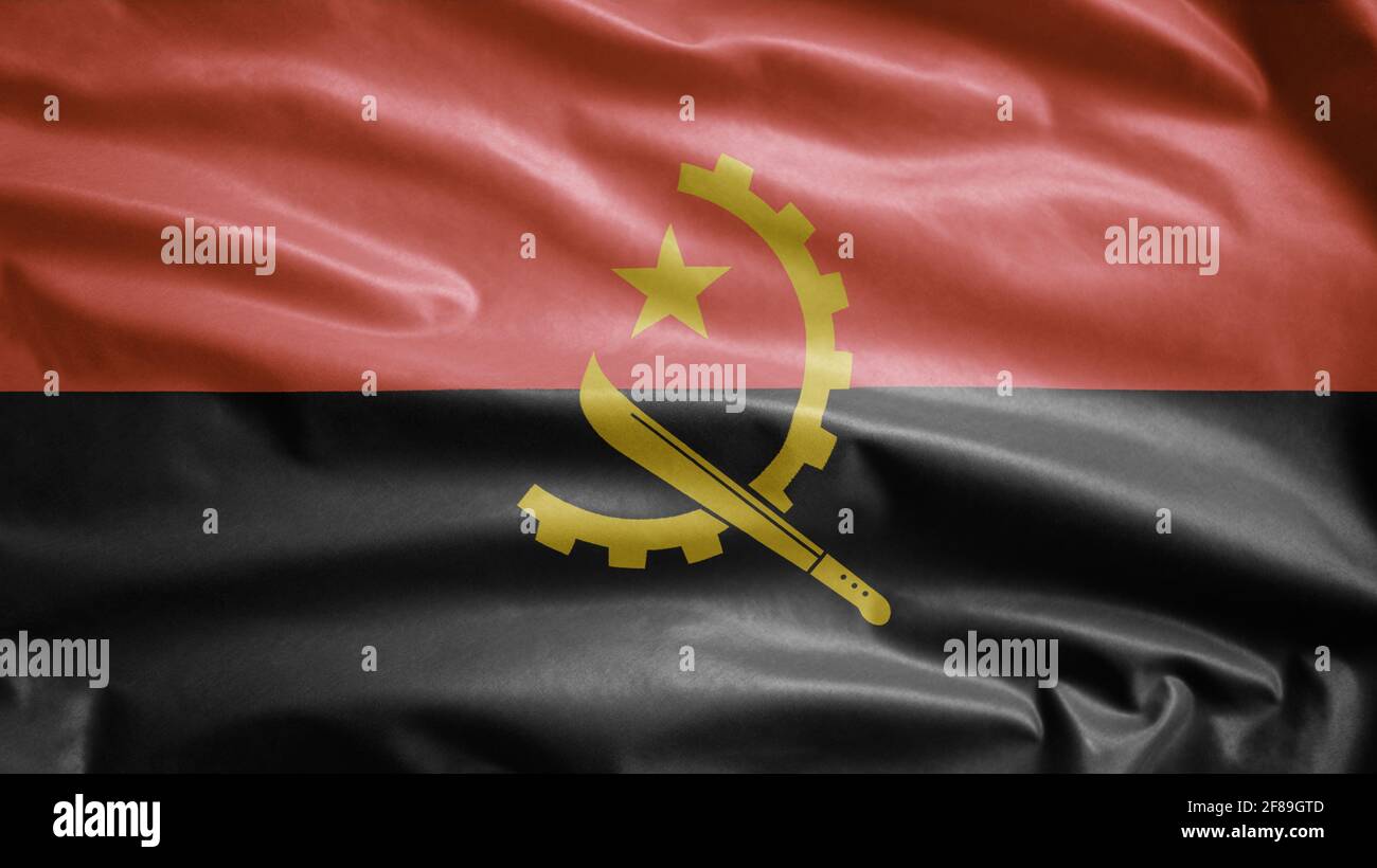 Angolan flag waving in the wind. Close up of Angola banner blowing ...