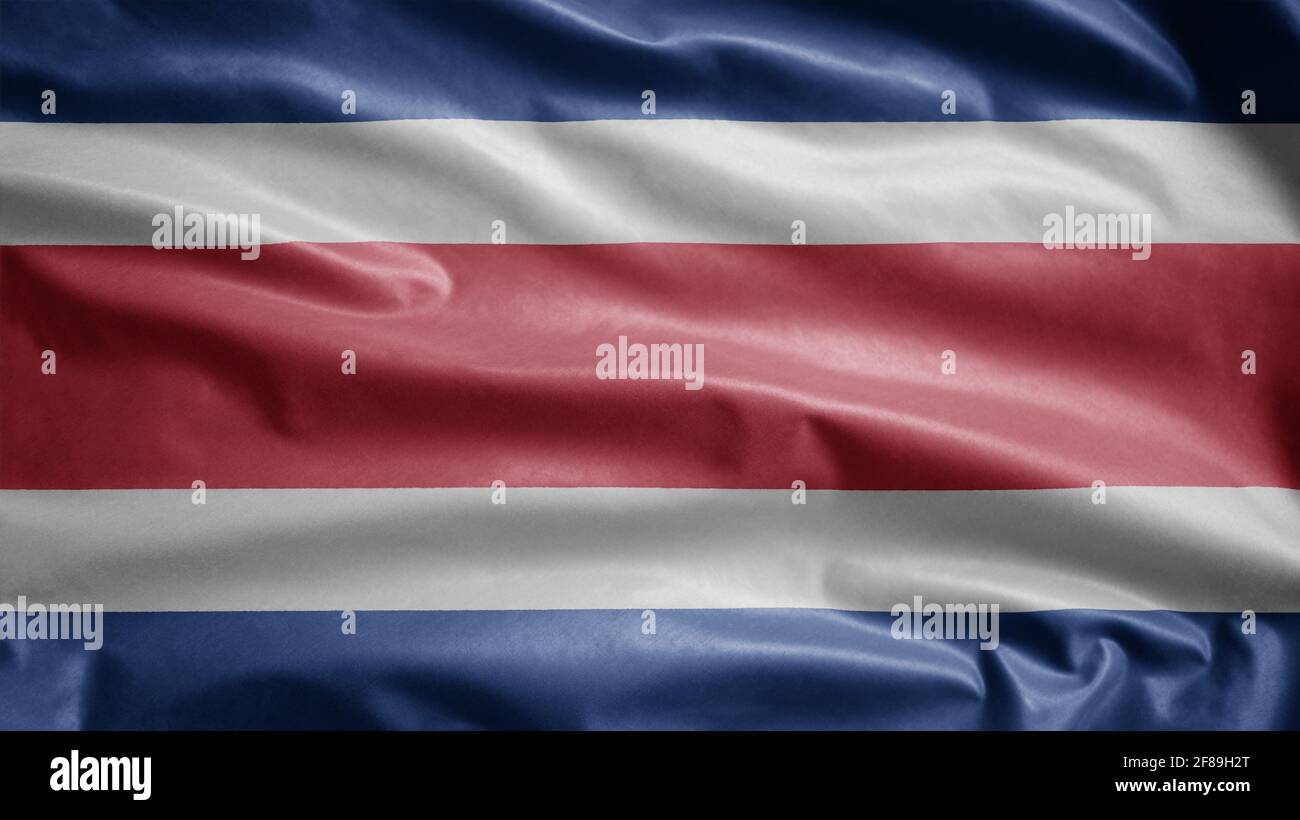 Costa Rica flag waving in the wind. Close up of Costa Rican banner ...