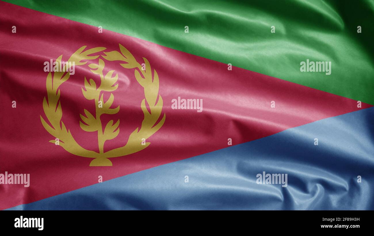 Eritrean flag waving in the wind. Close up of Eritrea banner blowing ...