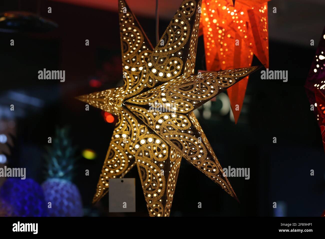 Star lanterns. A background of star lanterns Stock Photo - Alamy