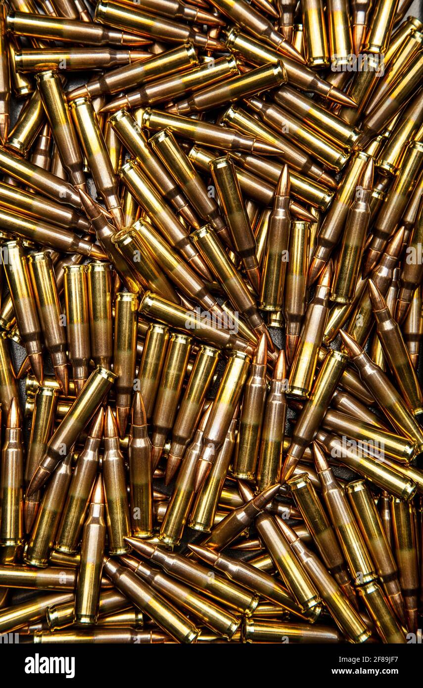 Ammunition for modern weapons. Background from cartridges for a carbine ...