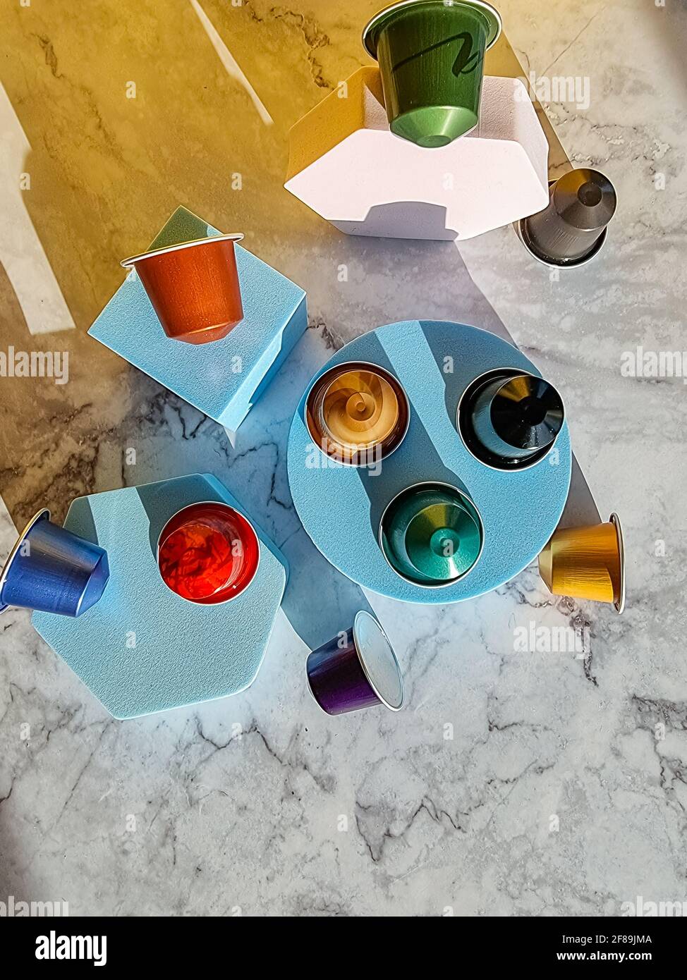 Set of coffee capsules isolated on beige background Top view Flat lay ...