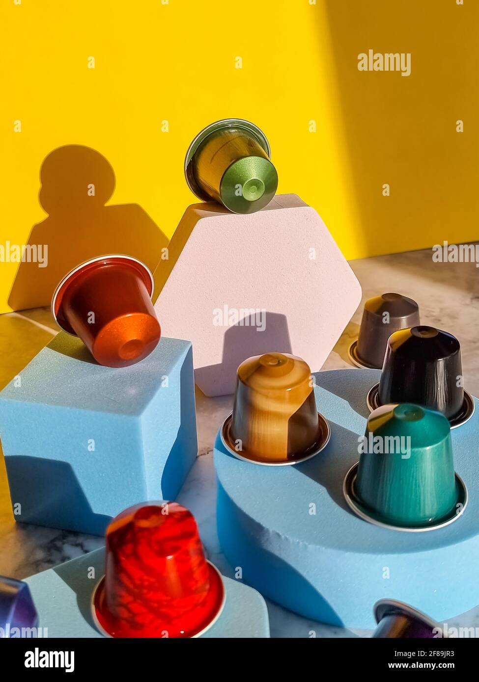 Set of coffee capsules isolated on beige background Top view Flat lay ...