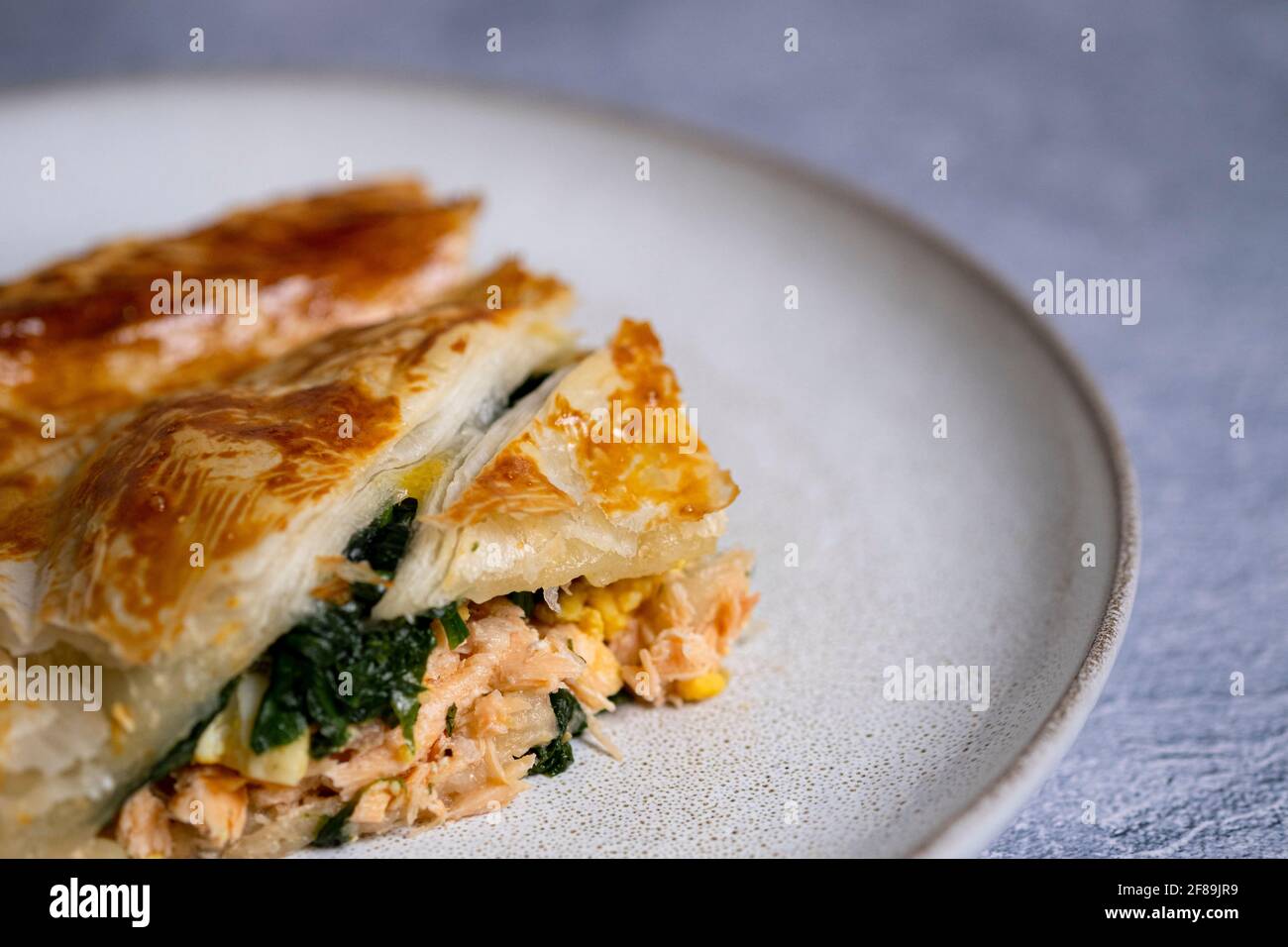 Puff pastry with salmon,spinach and boiled egg Stock Photo - Alamy