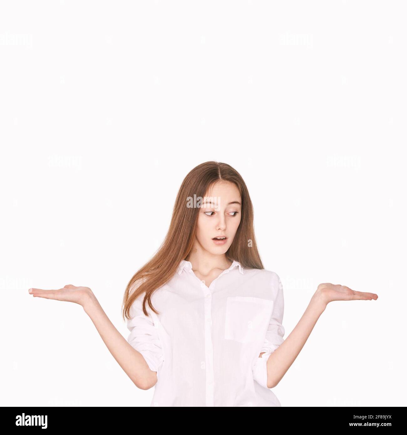 Compare two options. Choose concept. Embarrassed emotion Stock Photo ...