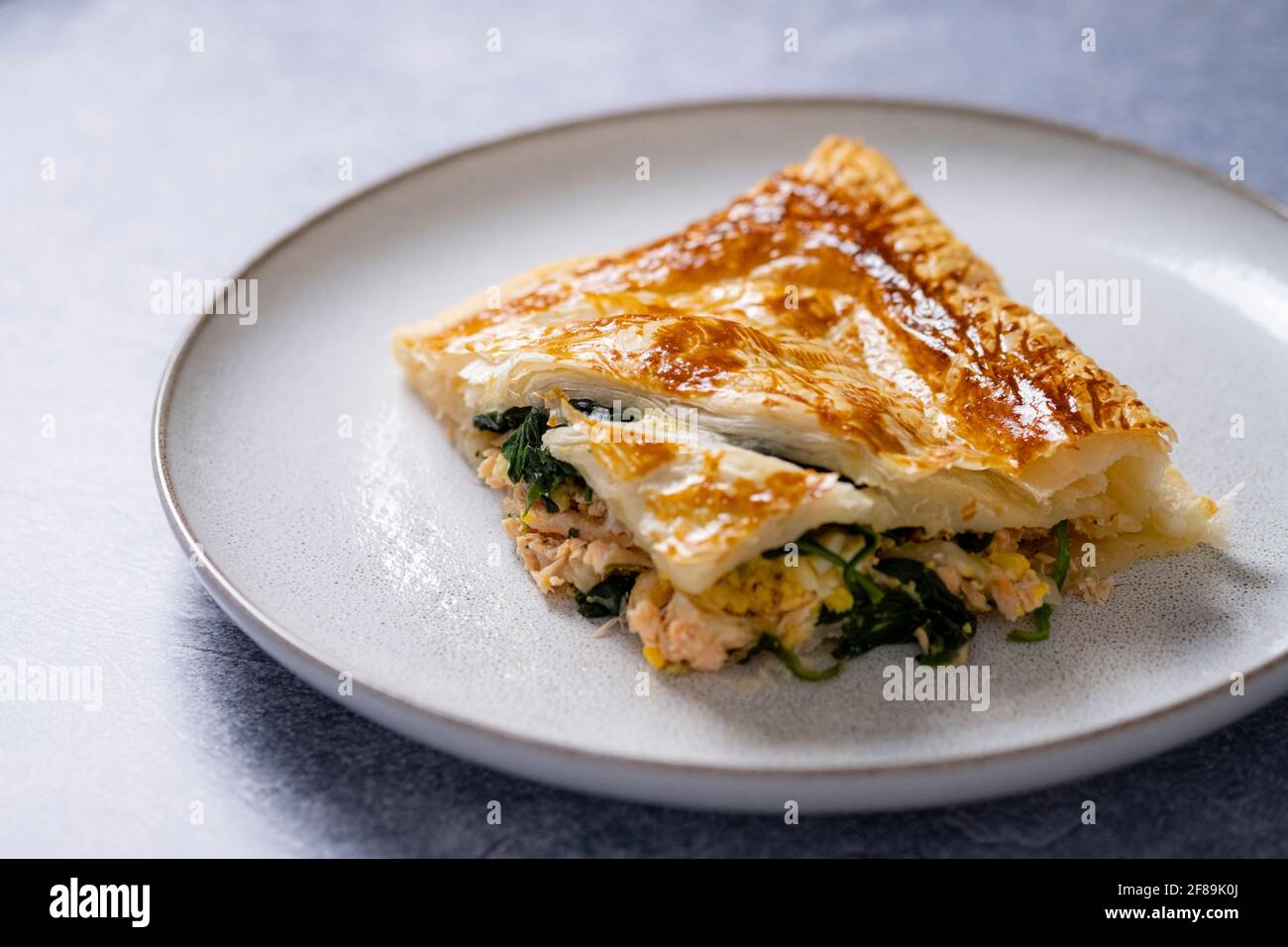 Puff pastry with salmon,spinach and boiled egg Stock Photo - Alamy