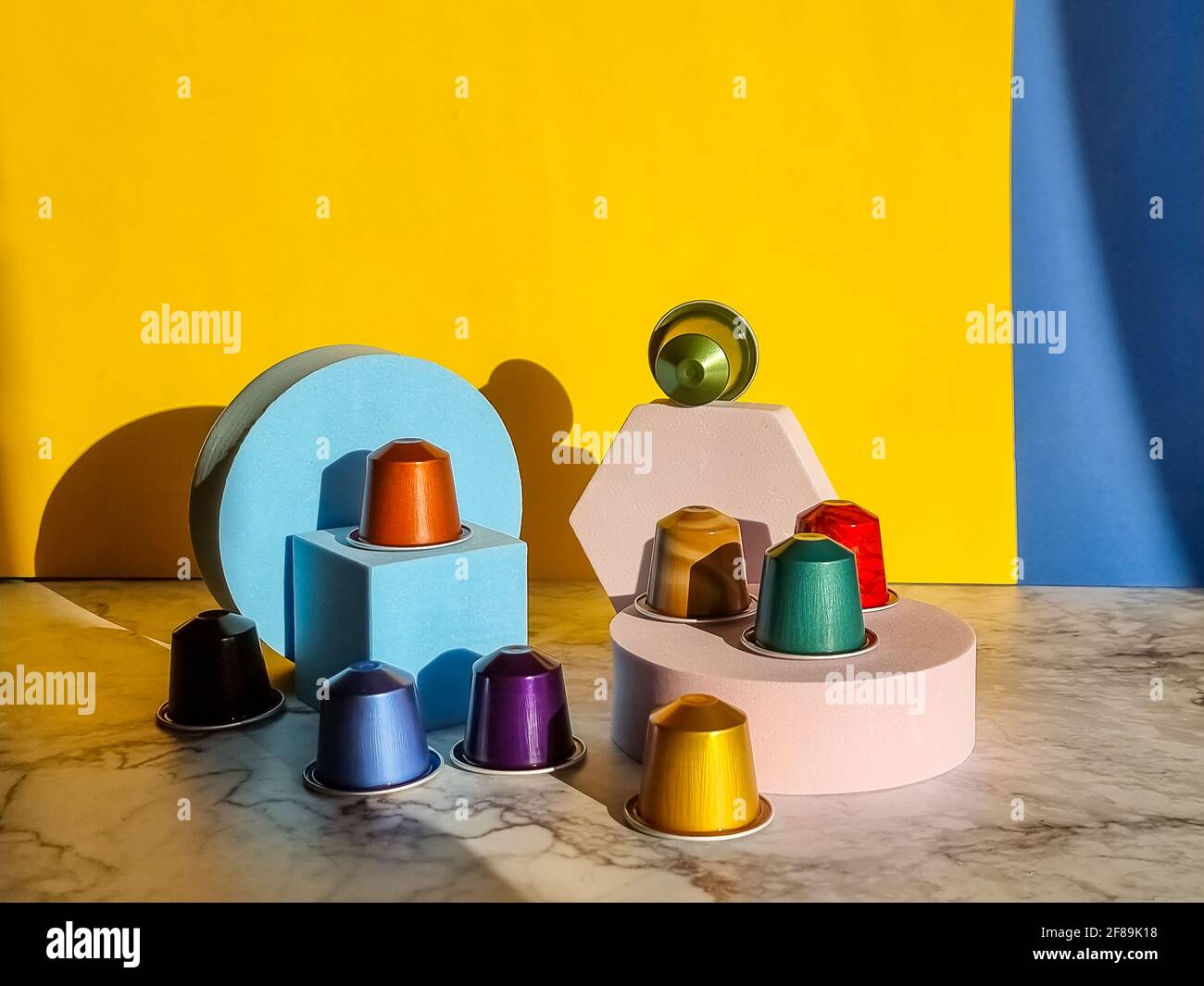 Set of coffee capsules isolated on beige background Top view Flat lay ...