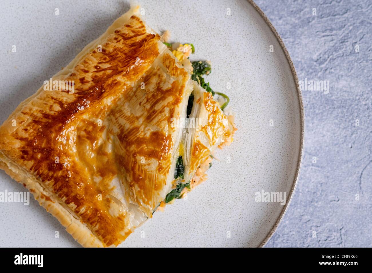 Puff pastry with salmon,spinach and boiled egg Stock Photo - Alamy