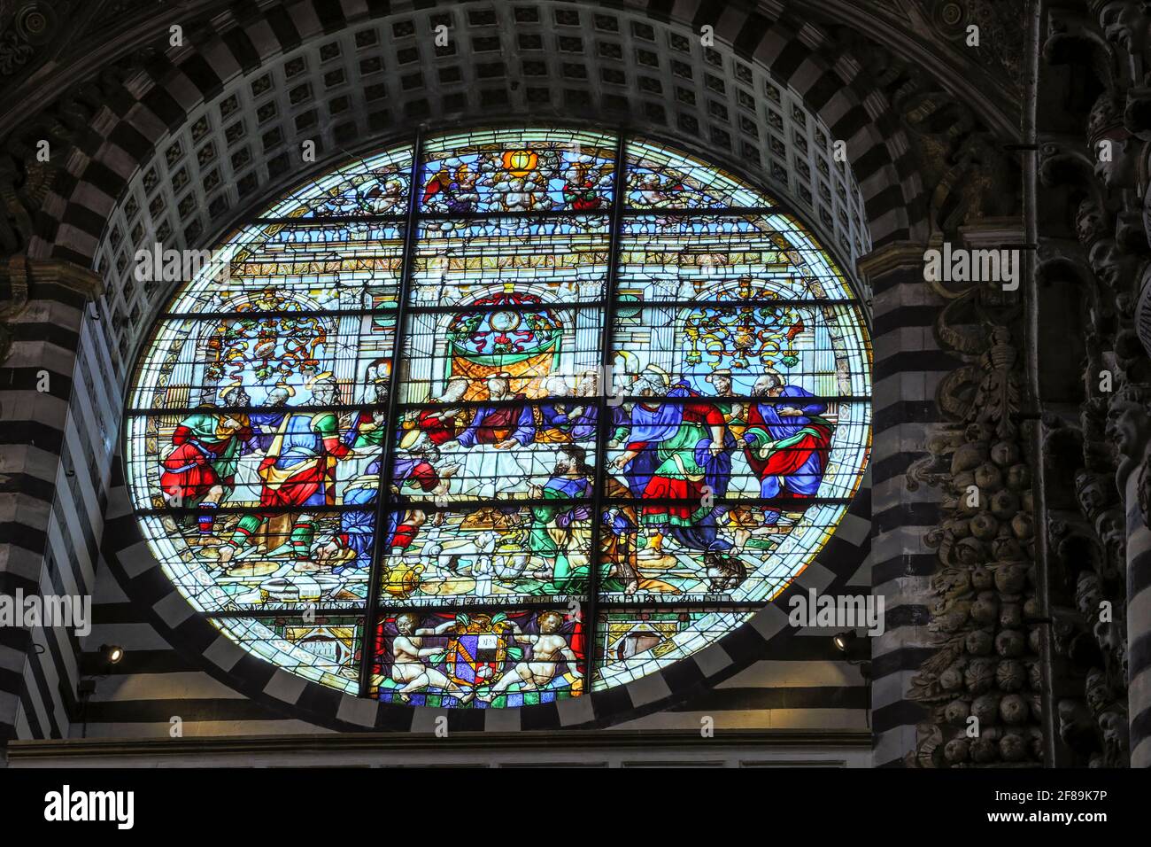 Siena, Italy. Stained glass rose window depicting the Last Supper in ...