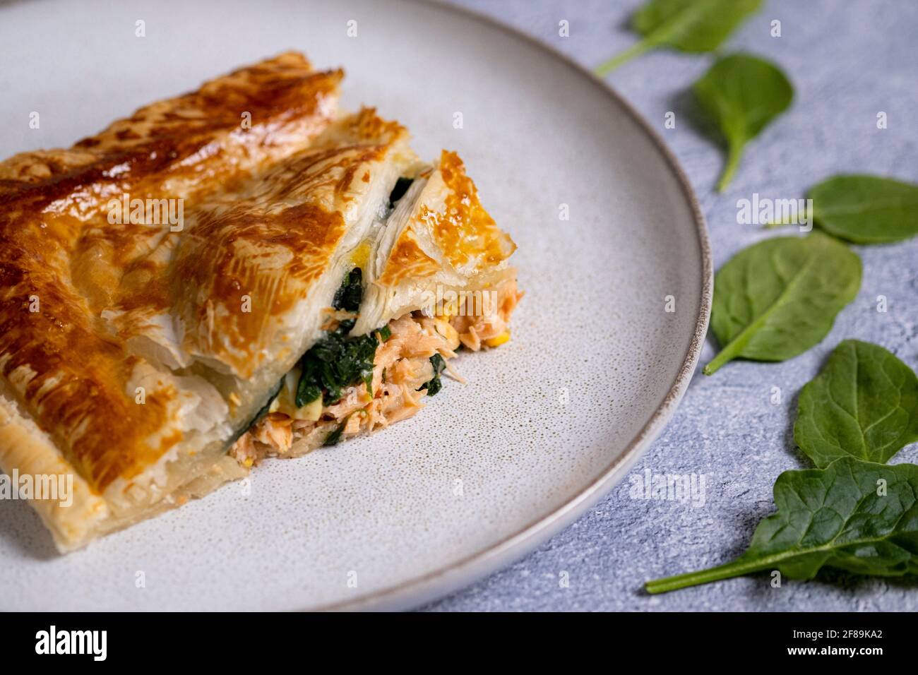 Puff pastry with salmon,spinach and boiled egg Stock Photo - Alamy