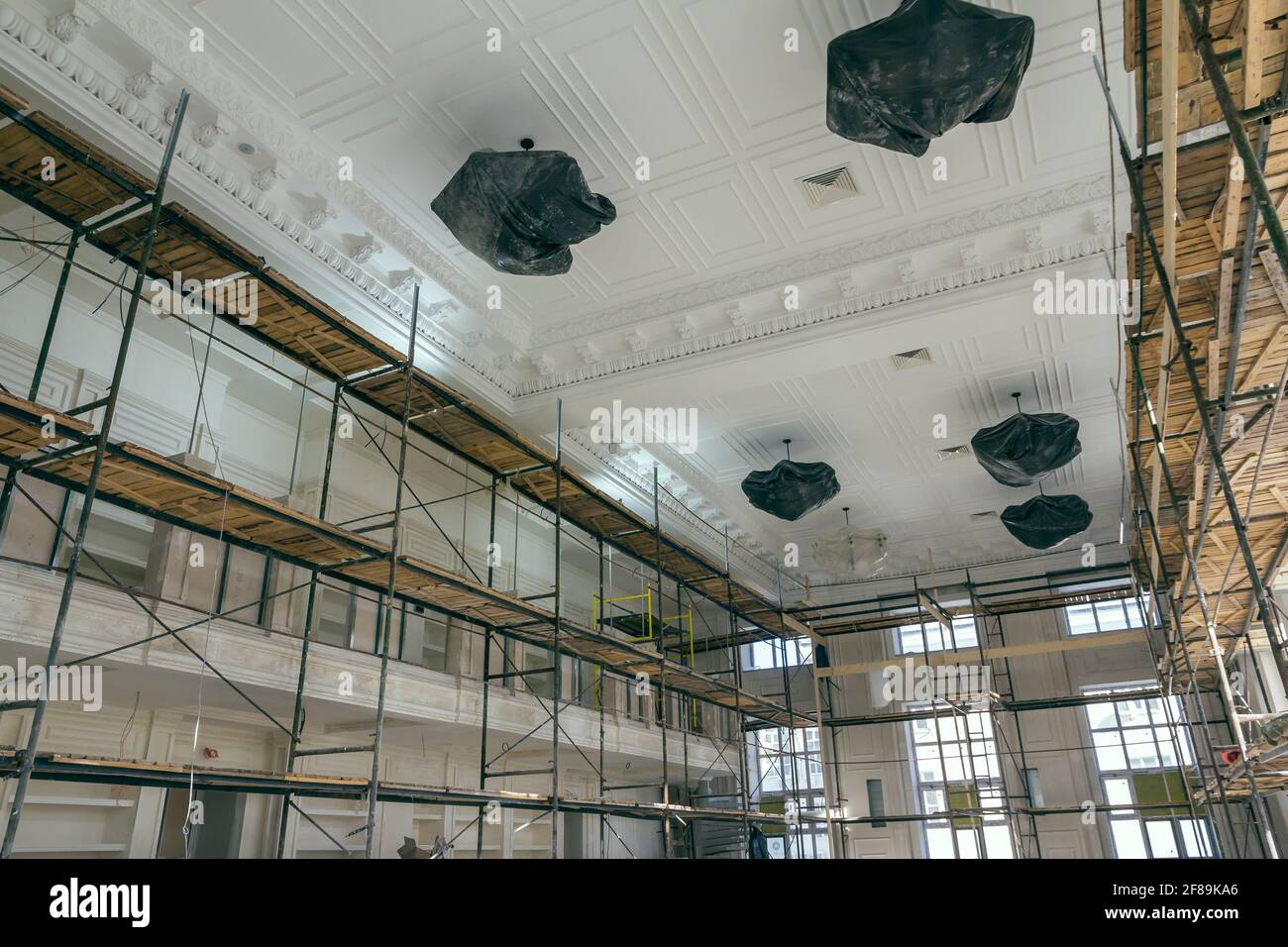 Reconstruction work. Repairing an old building. Building scaffolding ...