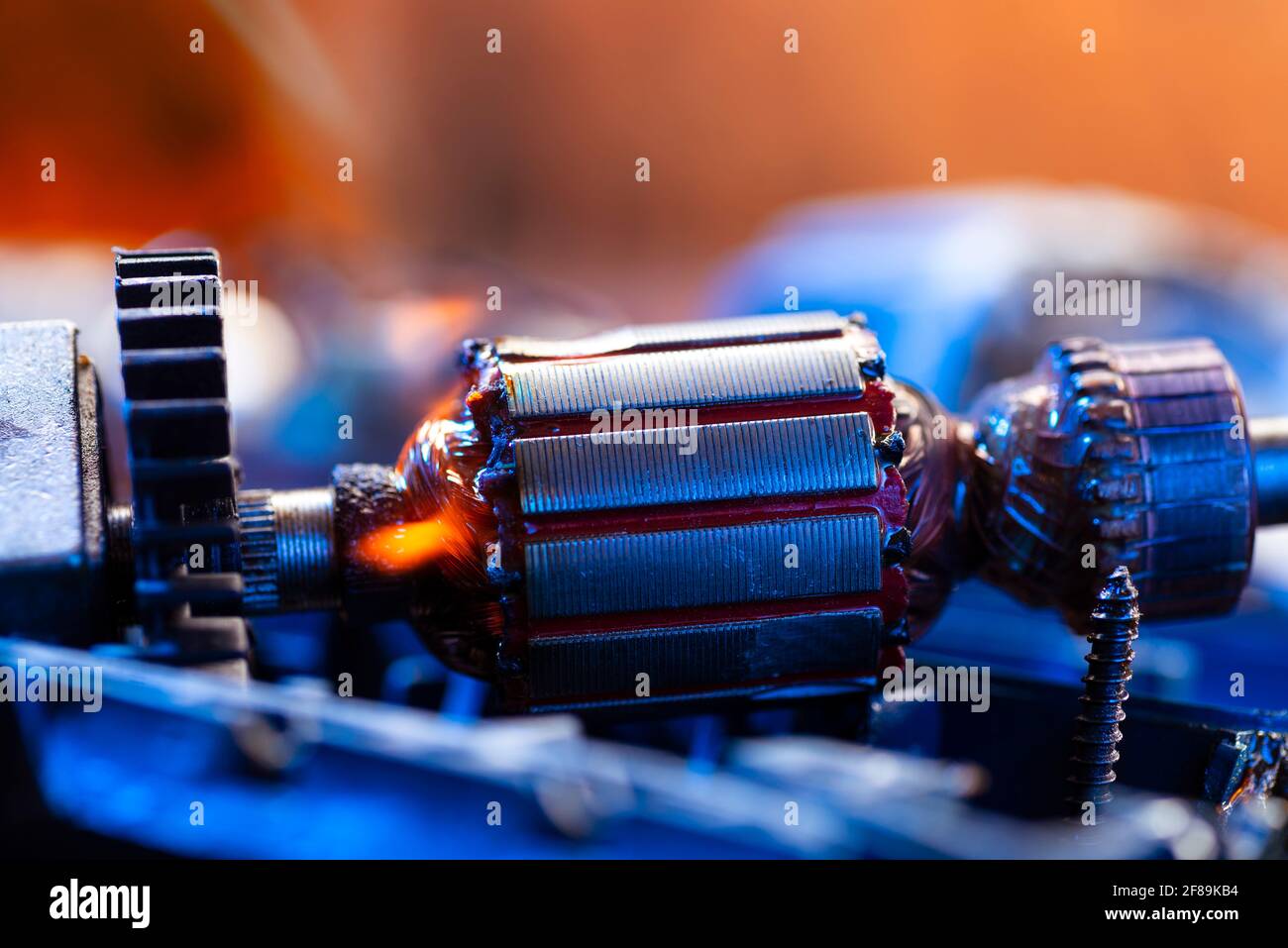 Burning wires on parts of an electrical appliance in a repair shop ...