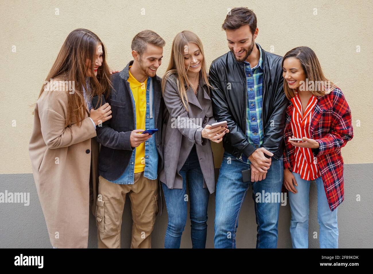 Young people using smartphones - Group of social media co workers ...
