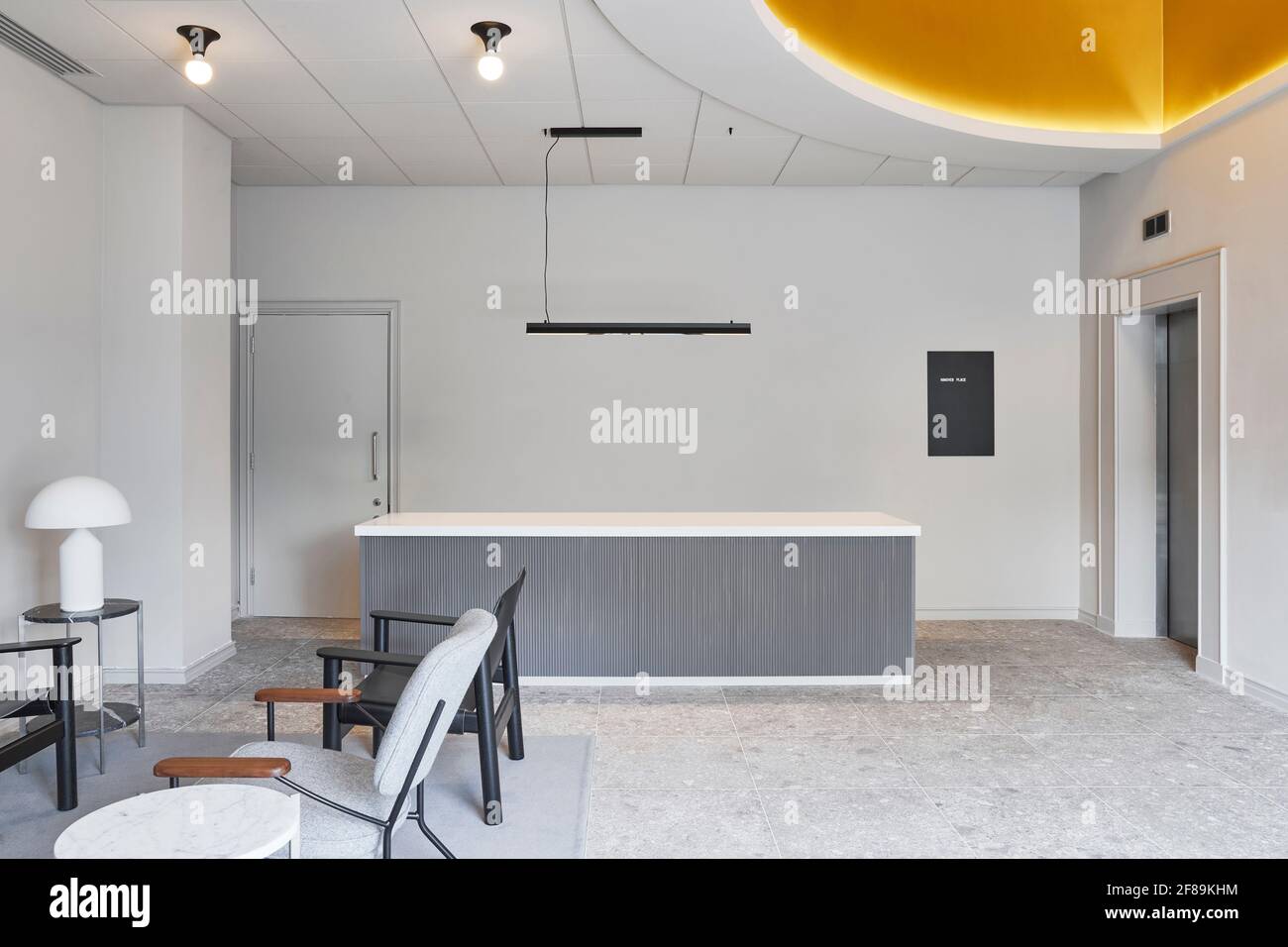 Reception desk with seating area and empty desk. Hanover Place ...