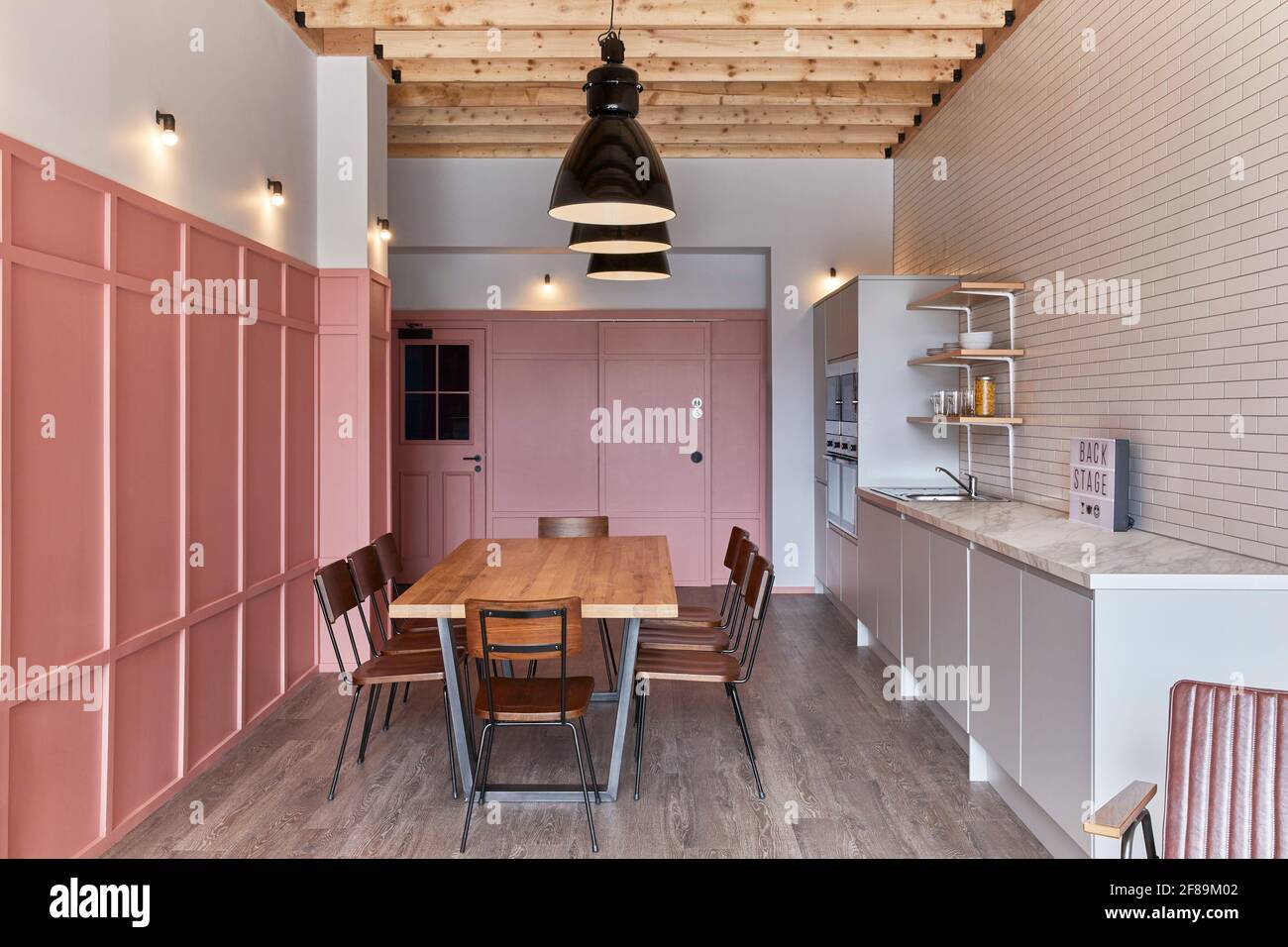 Pendant lights dining table hi-res stock photography and images - Alamy