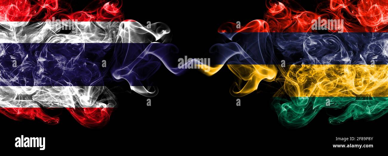 Thailand, Thai vs Mauritius smoky mystic flags placed side by side ...