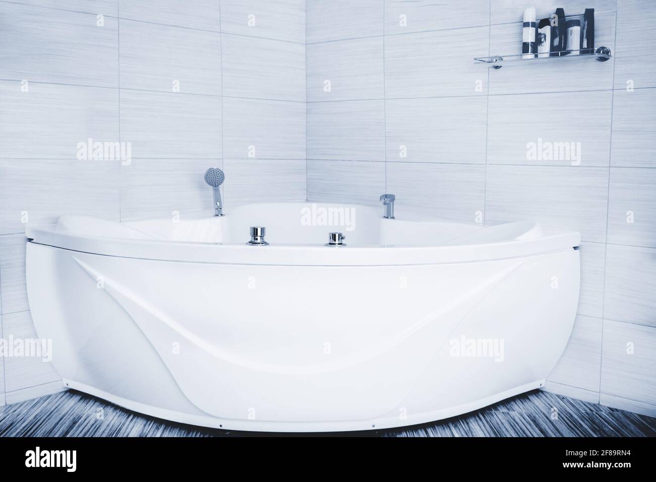 Large triangular bath in the house. Sanitary device for taking a shower ...