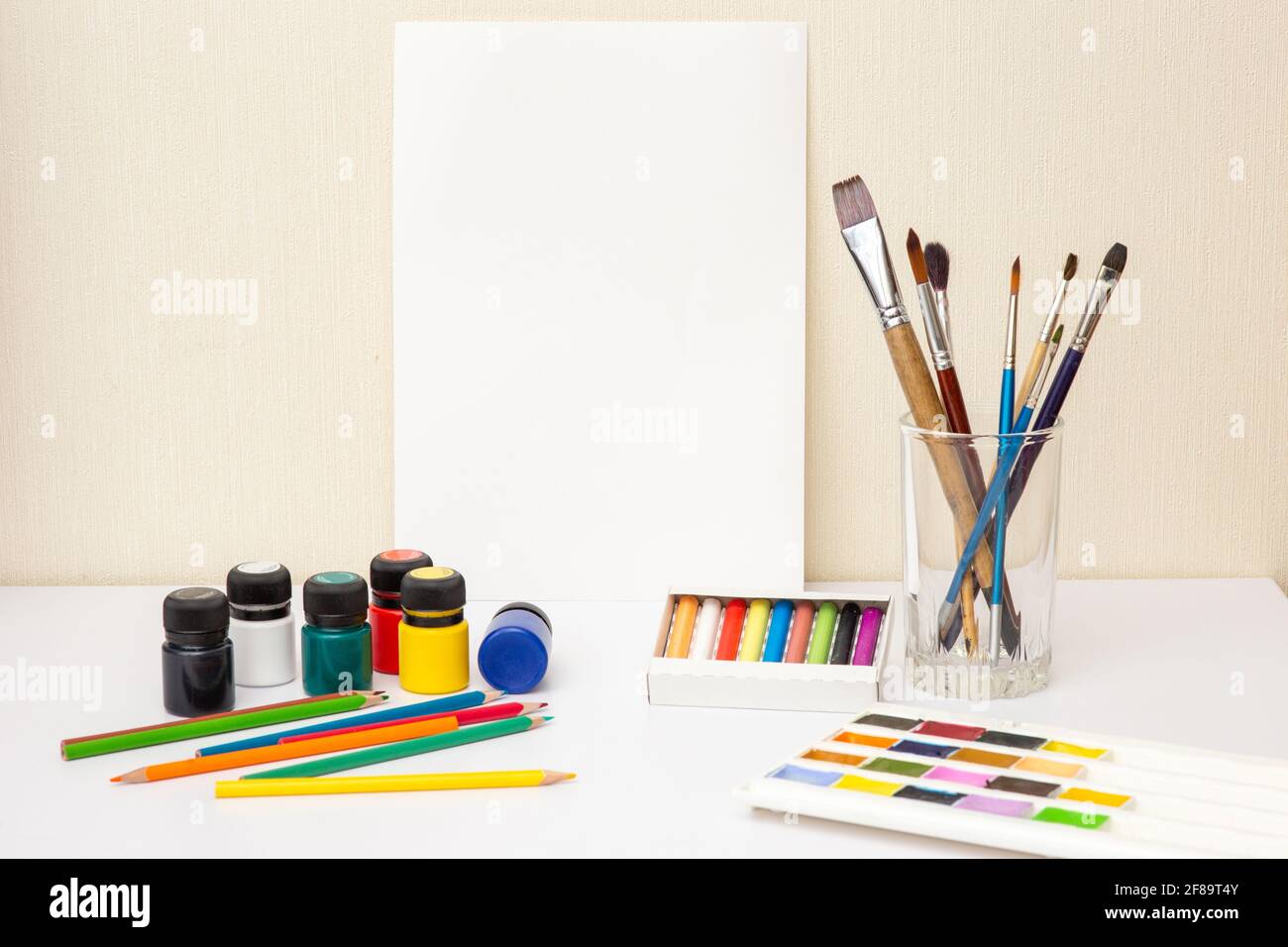 colorful drawing supplies on white table. Mock up Stock Photo - Alamy