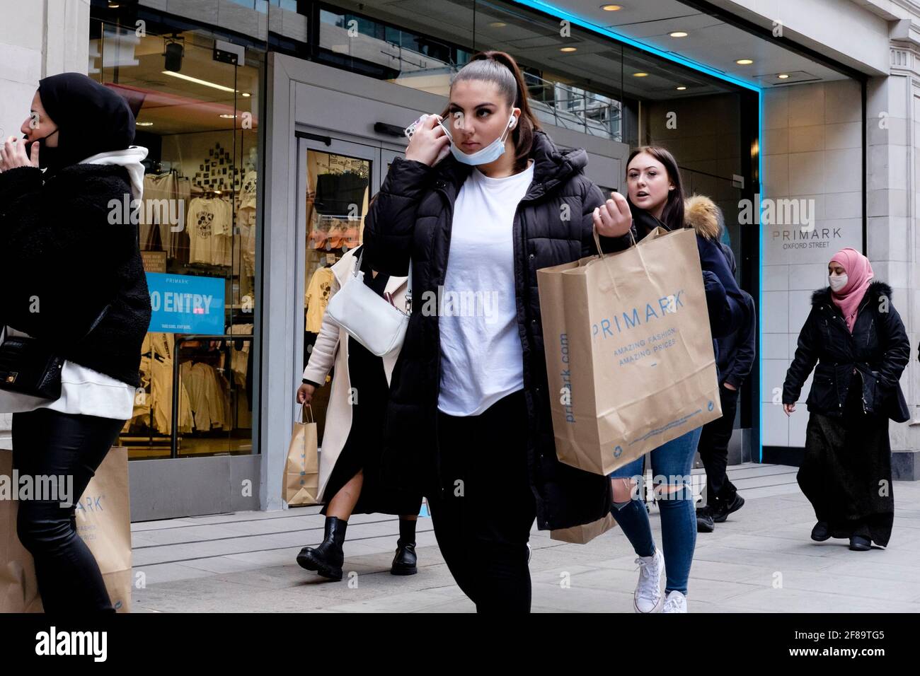 Shoppers outside a Primark store, London, UK Stock Photo - Alamy