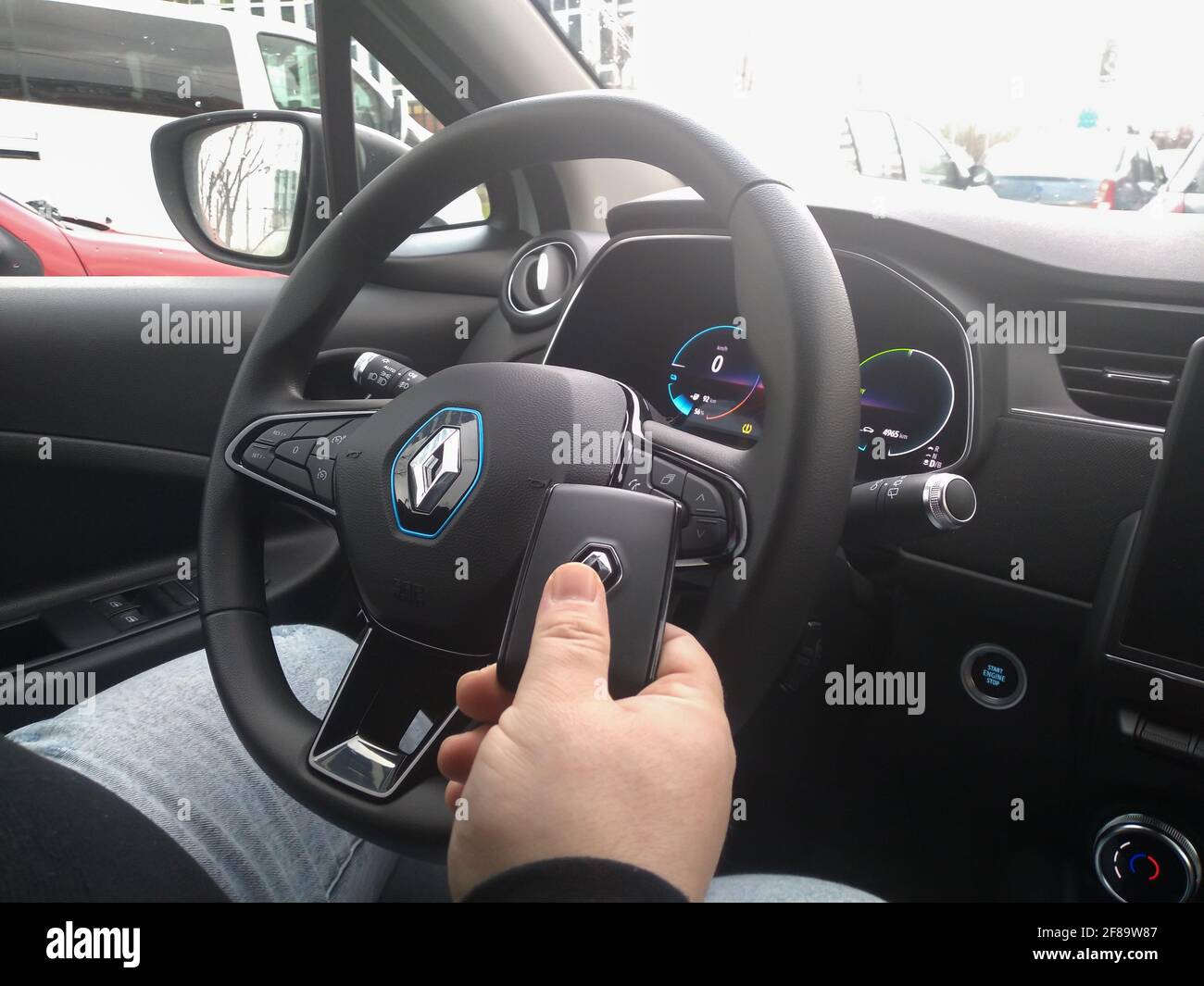 New Renault Zoe electric car interior. Steering wheel with control ...