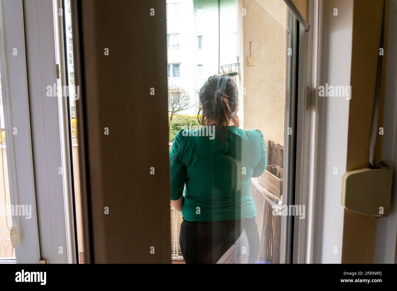 Woman smoking balcony hi-res stock photography and images - Alamy