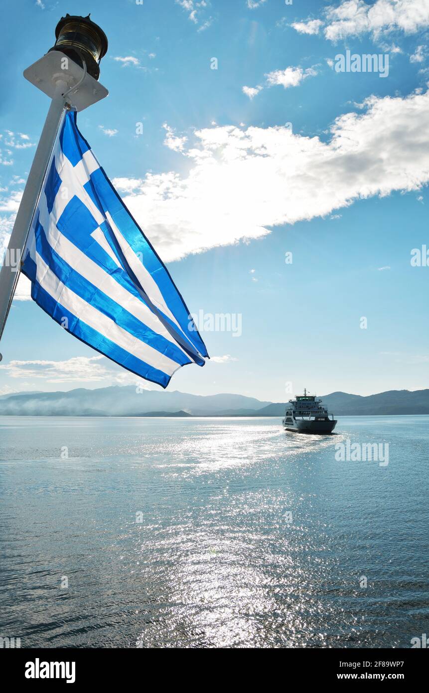 Greek flag and ferry boat in the Aegean Sea Stock Photo - Alamy
