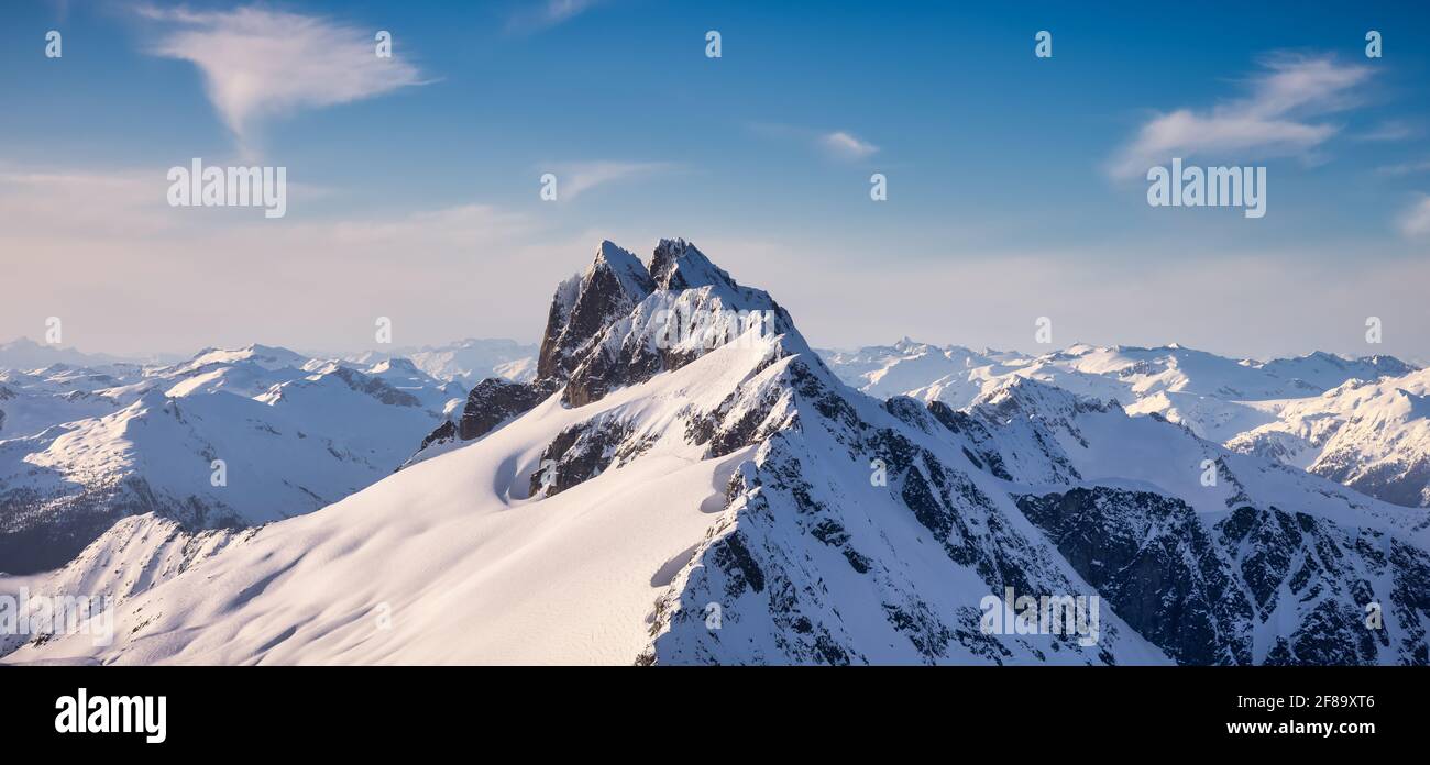 Aerial View from Airplane of Blue Snow Covered Canadian Mountain ...