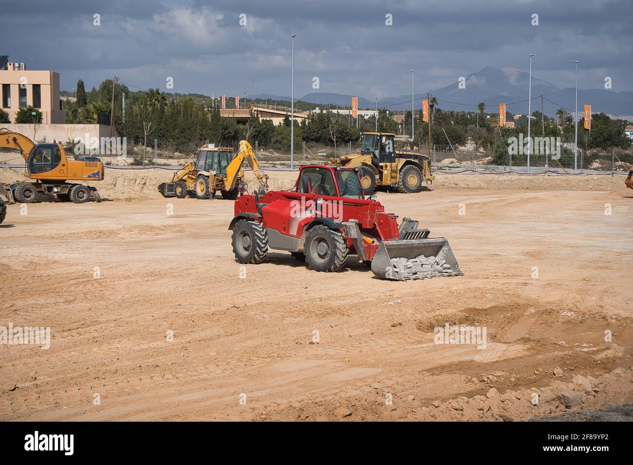 details of excavating machines in a construction of an urbanization ...