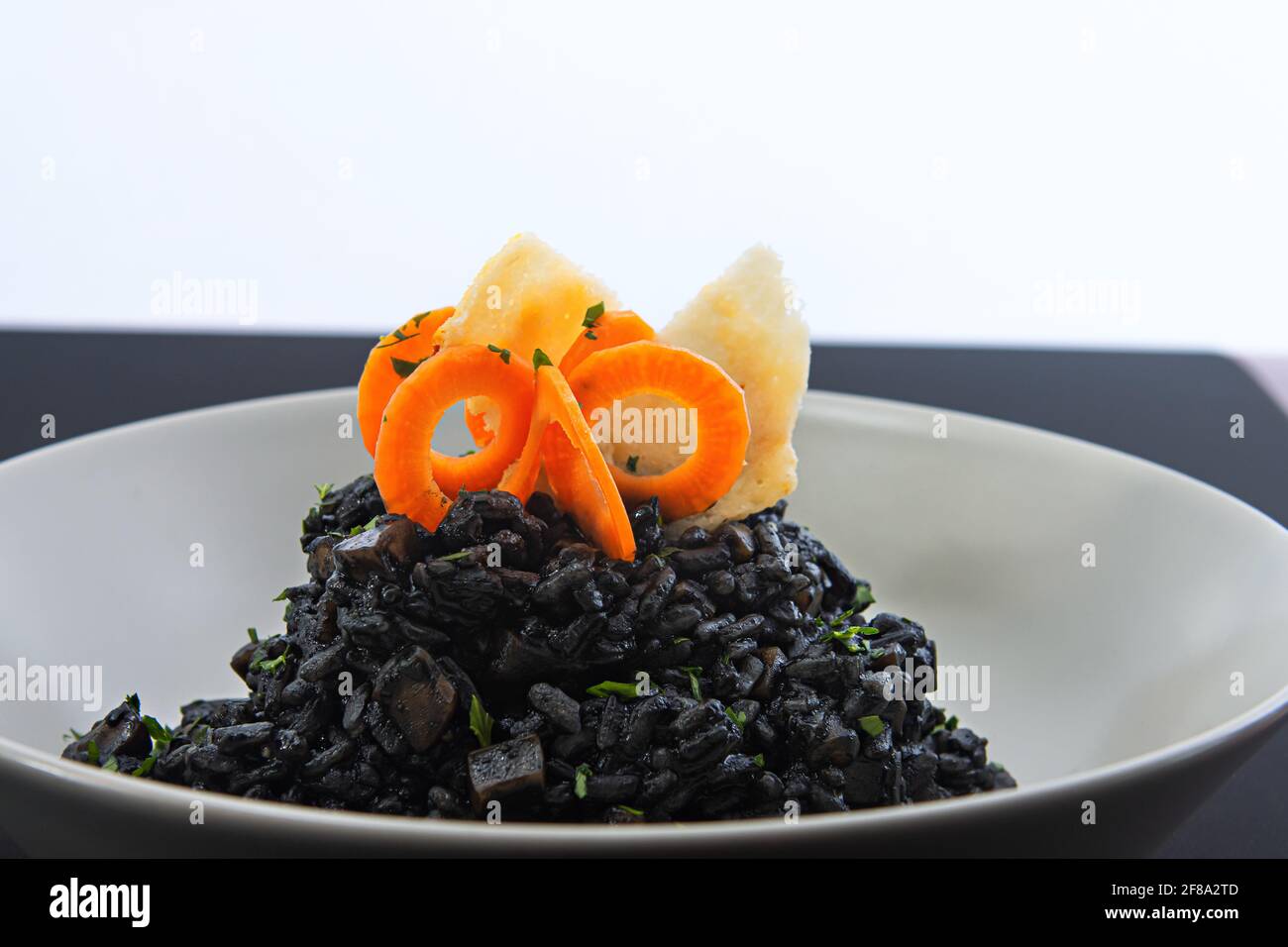 Black risotto with scampi hi-res stock photography and images - Alamy