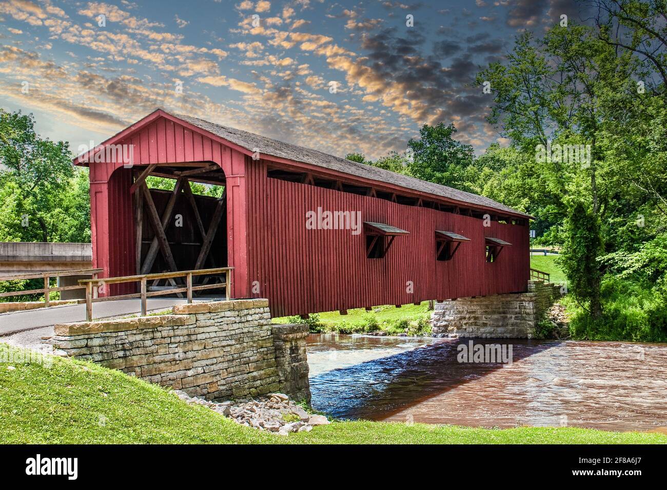 Old Red Covered Bridge Over Muddy River Stock Photo - Alamy