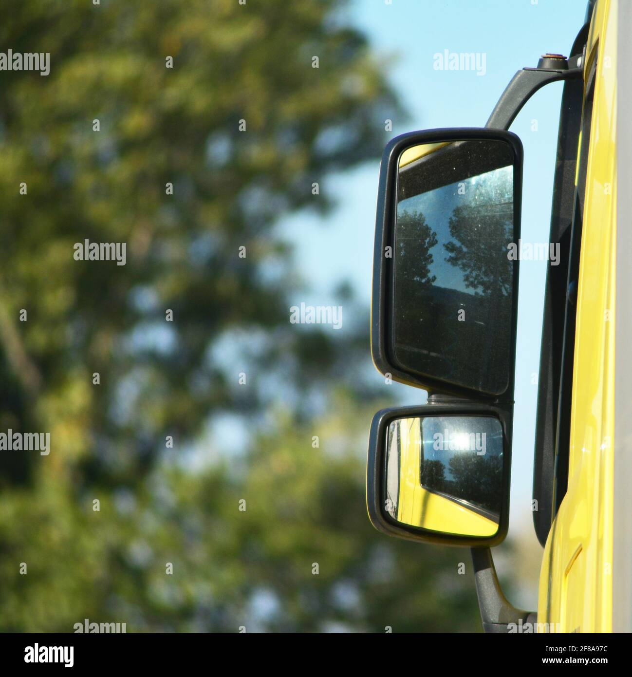 a sun reflection on a left rear truck mirror Stock Photo - Alamy
