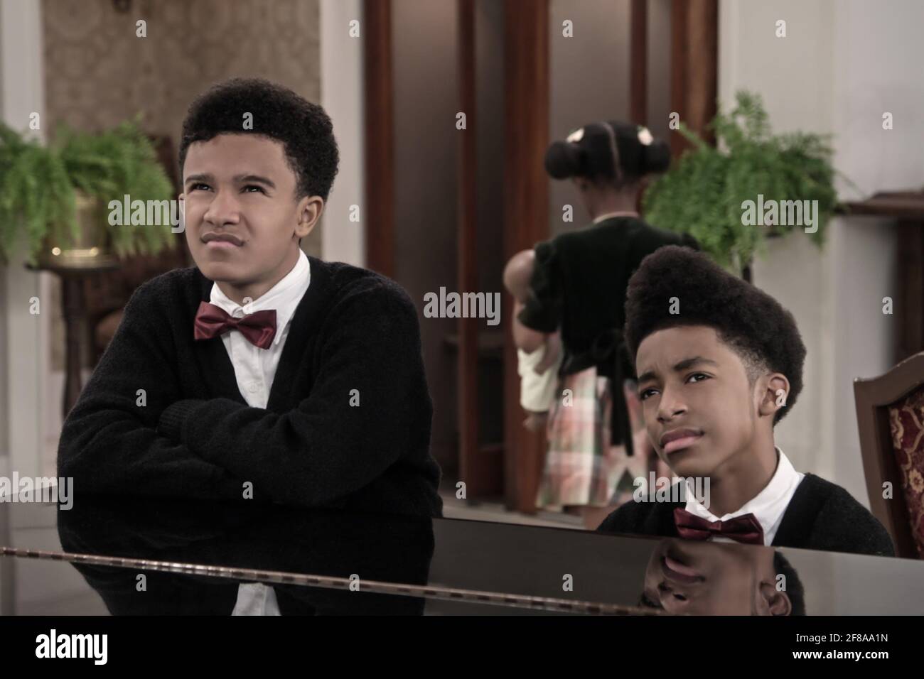 FAMILY REUNION, from left: Cameron J. Wright, Isaiah Russell Bailey ...