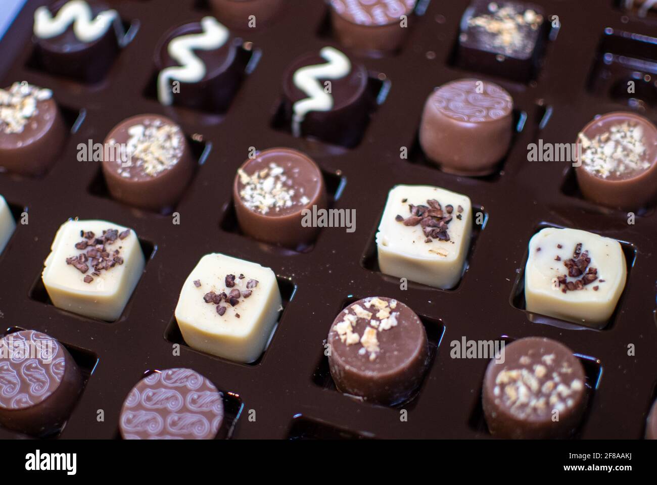 close up box of fancy chocolates Stock Photo - Alamy