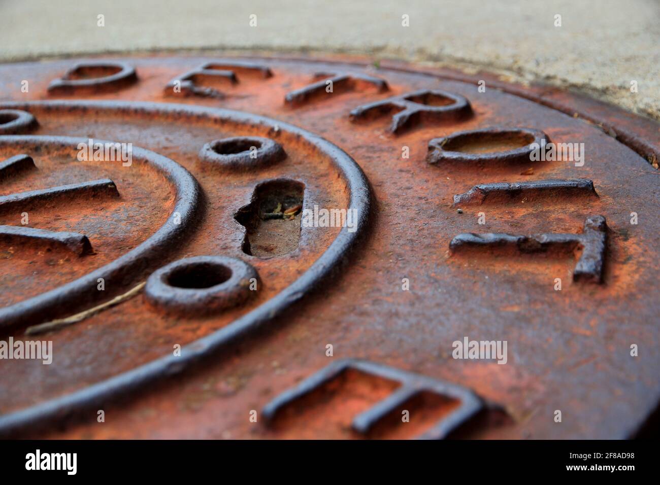 Close-up of Rusty Detroit Manhole Cover Stock Photo - Alamy