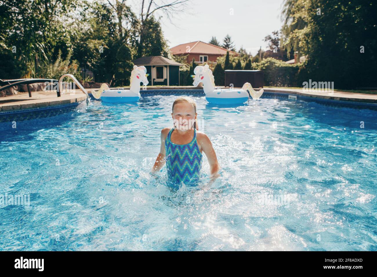 Backyard kids pool hi-res stock photography and images - Alamy