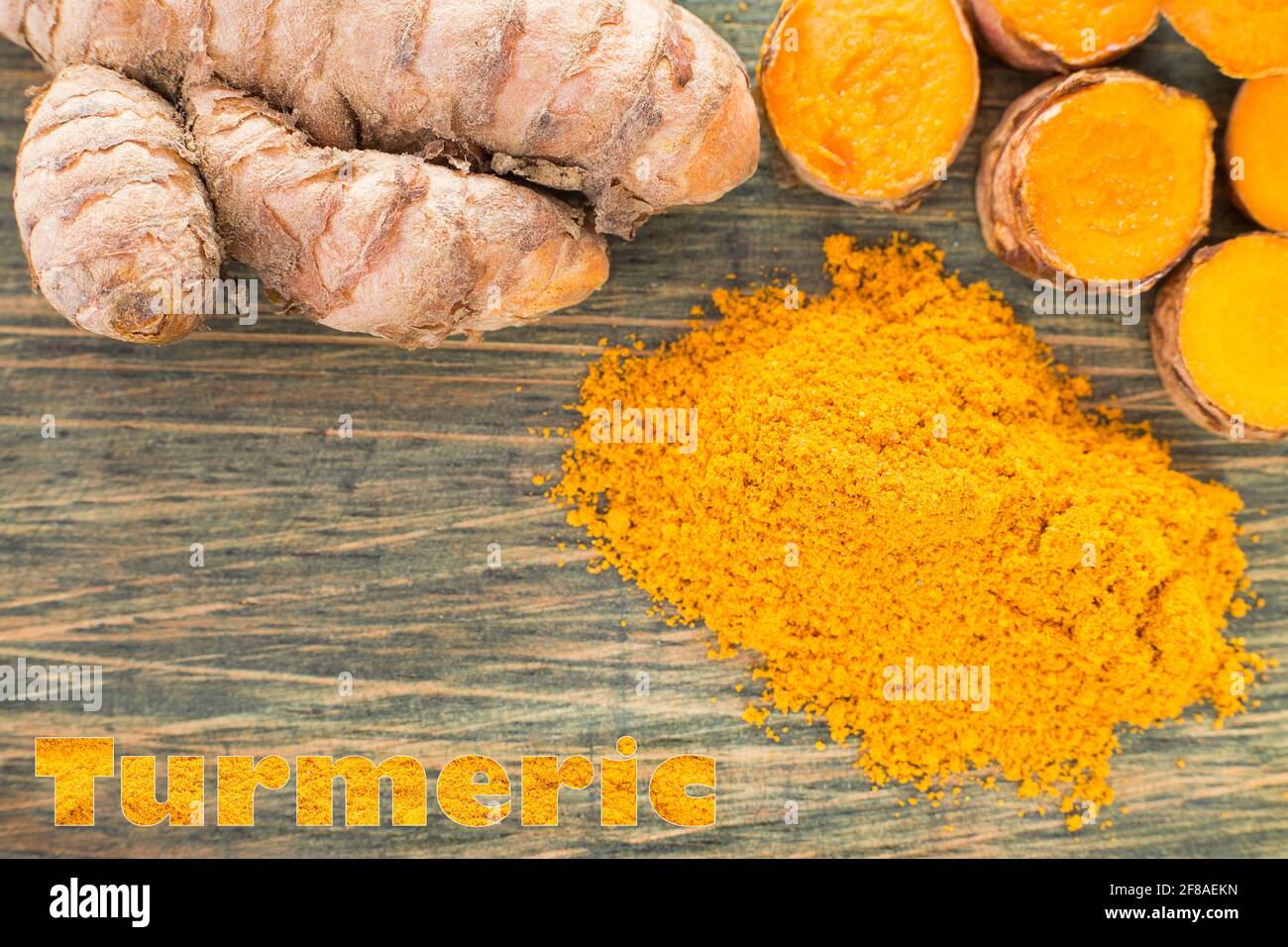 Roots and turmeric powder - Curcuma longa Stock Photo - Alamy