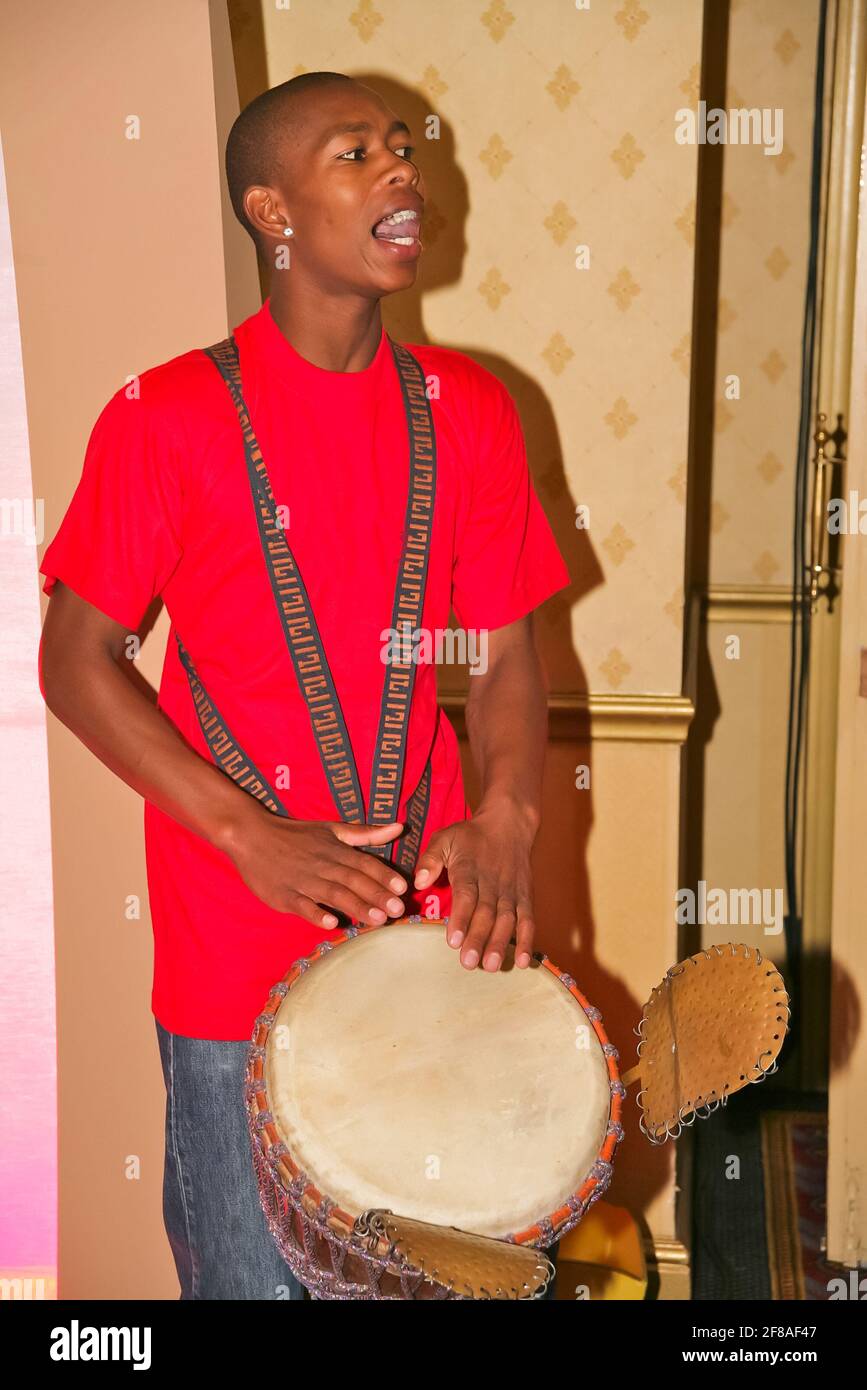 Zulu man playing drum hi-res stock photography and images - Alamy