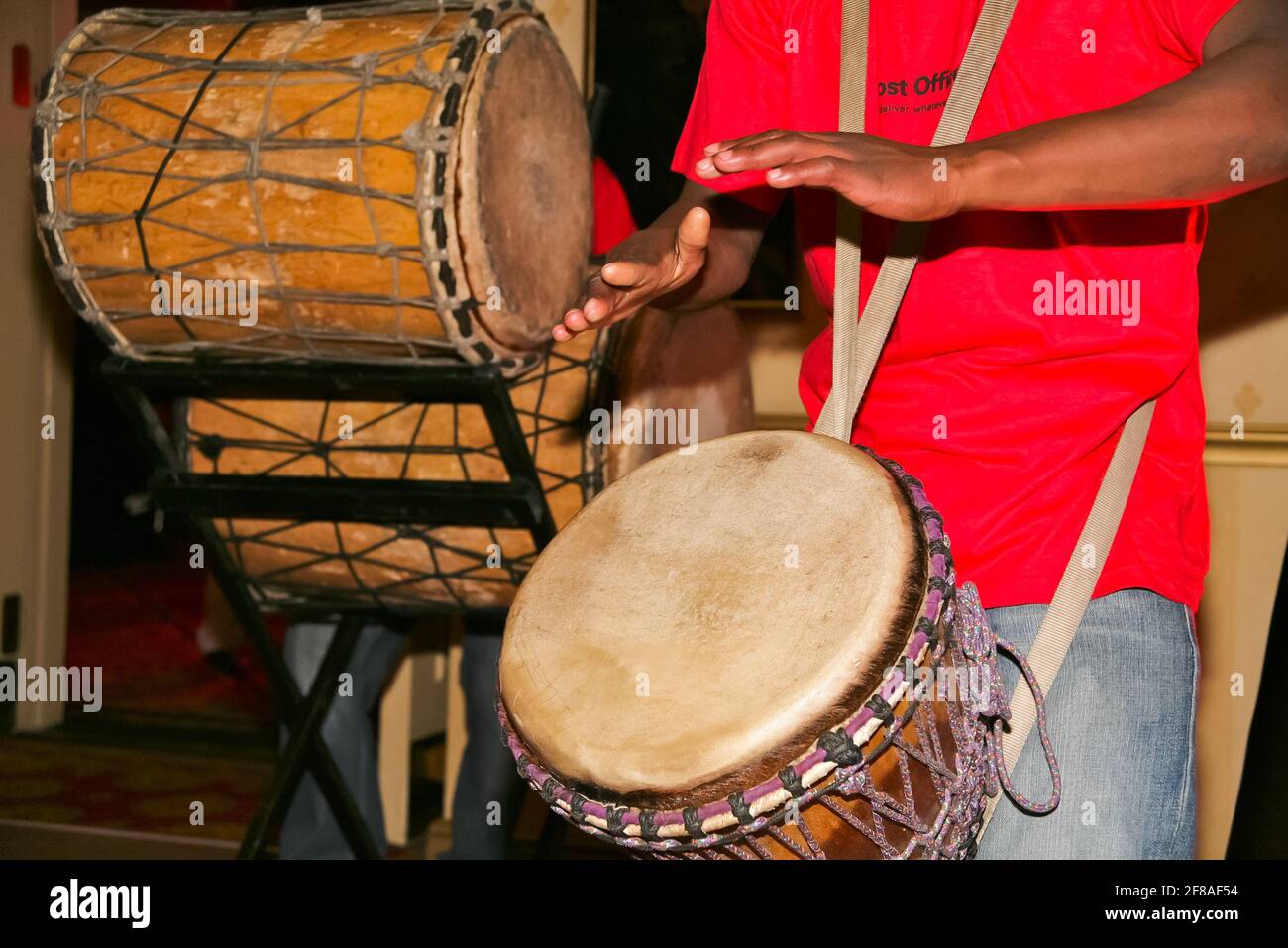 Zulu man playing drum hi-res stock photography and images - Alamy